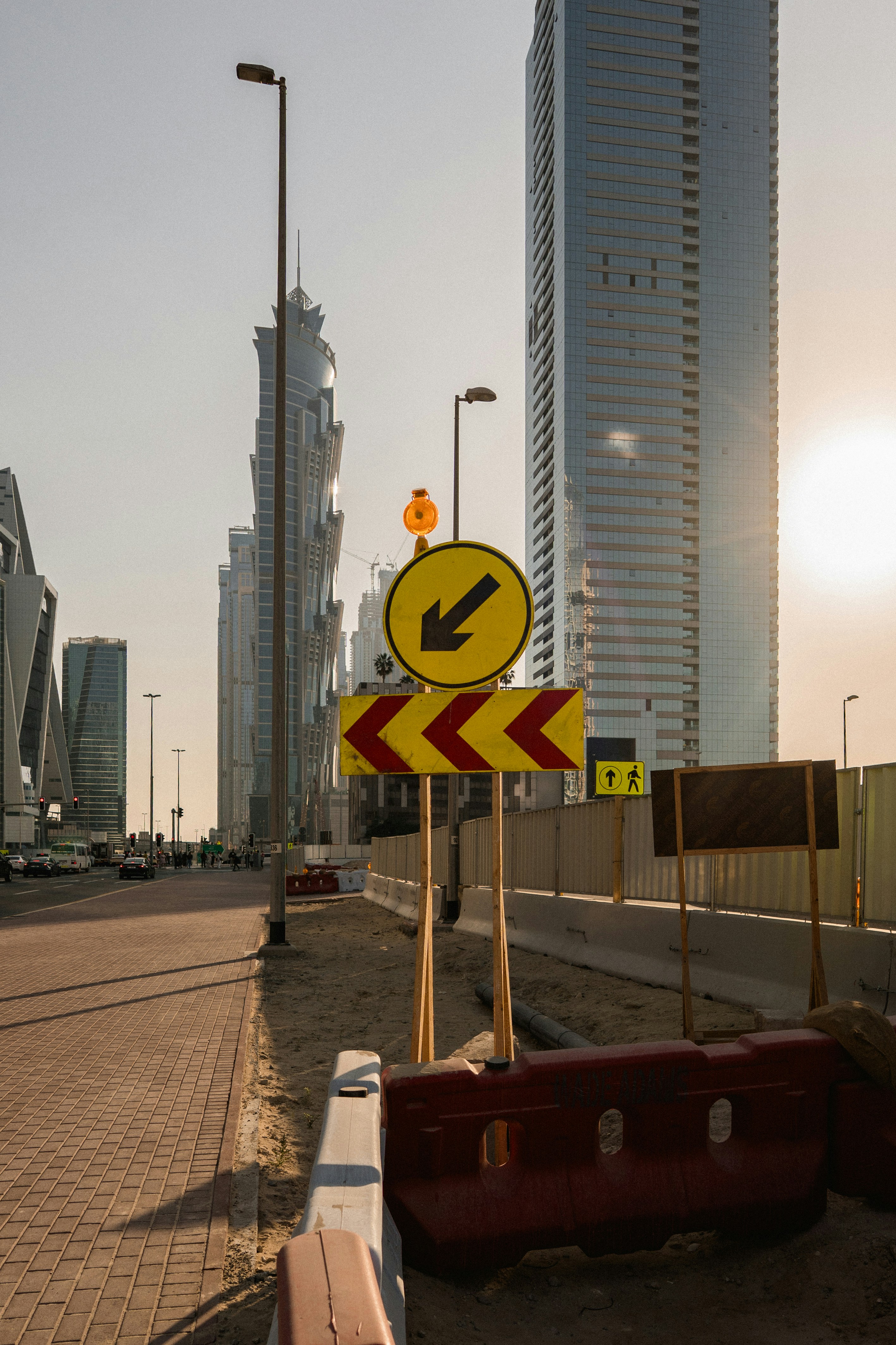 Construction Corridor under Sunset Skyscrapers