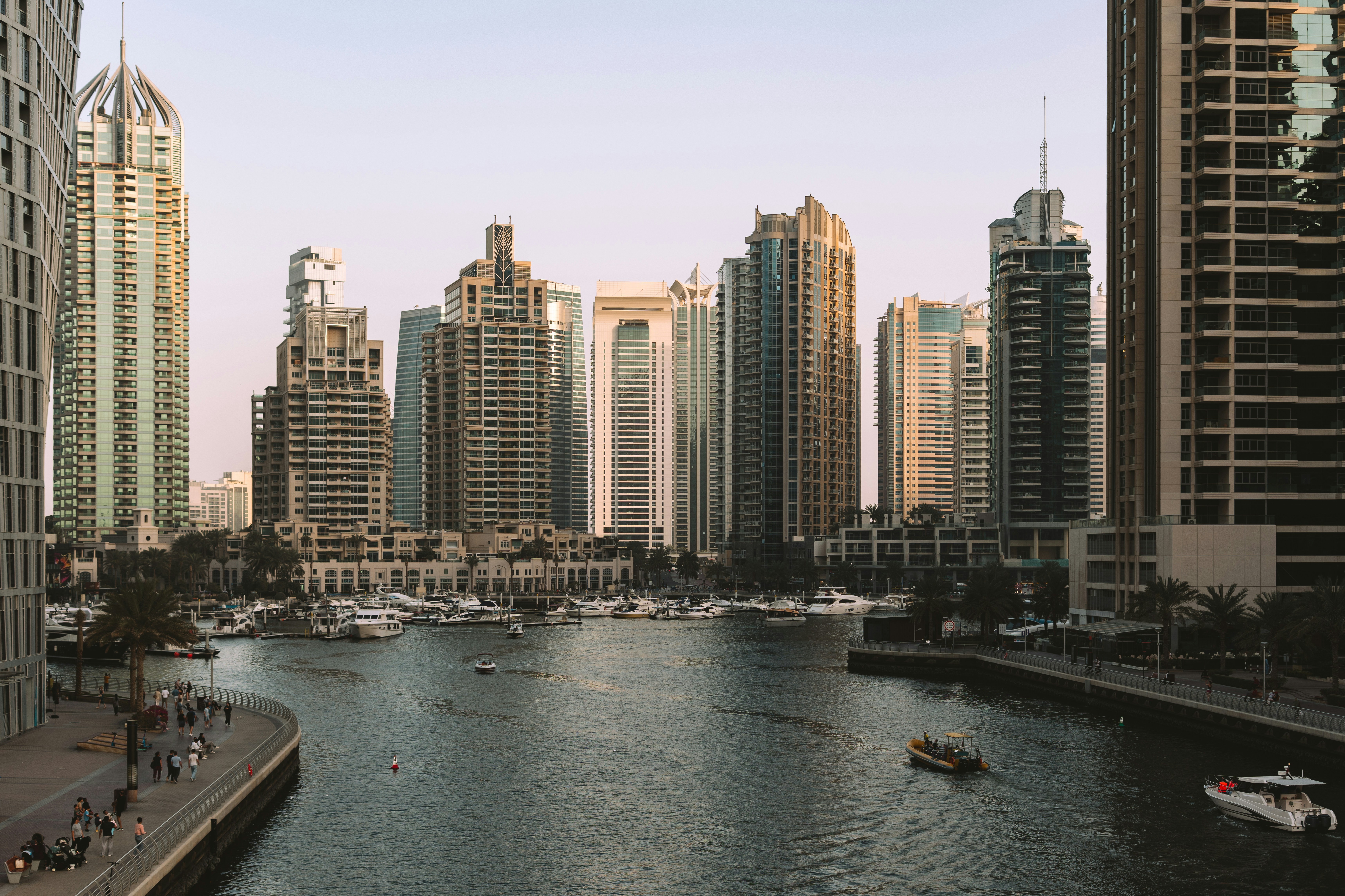 Skyscrapers Reflect the Canal: A Marina Corridor in Dusk Light
