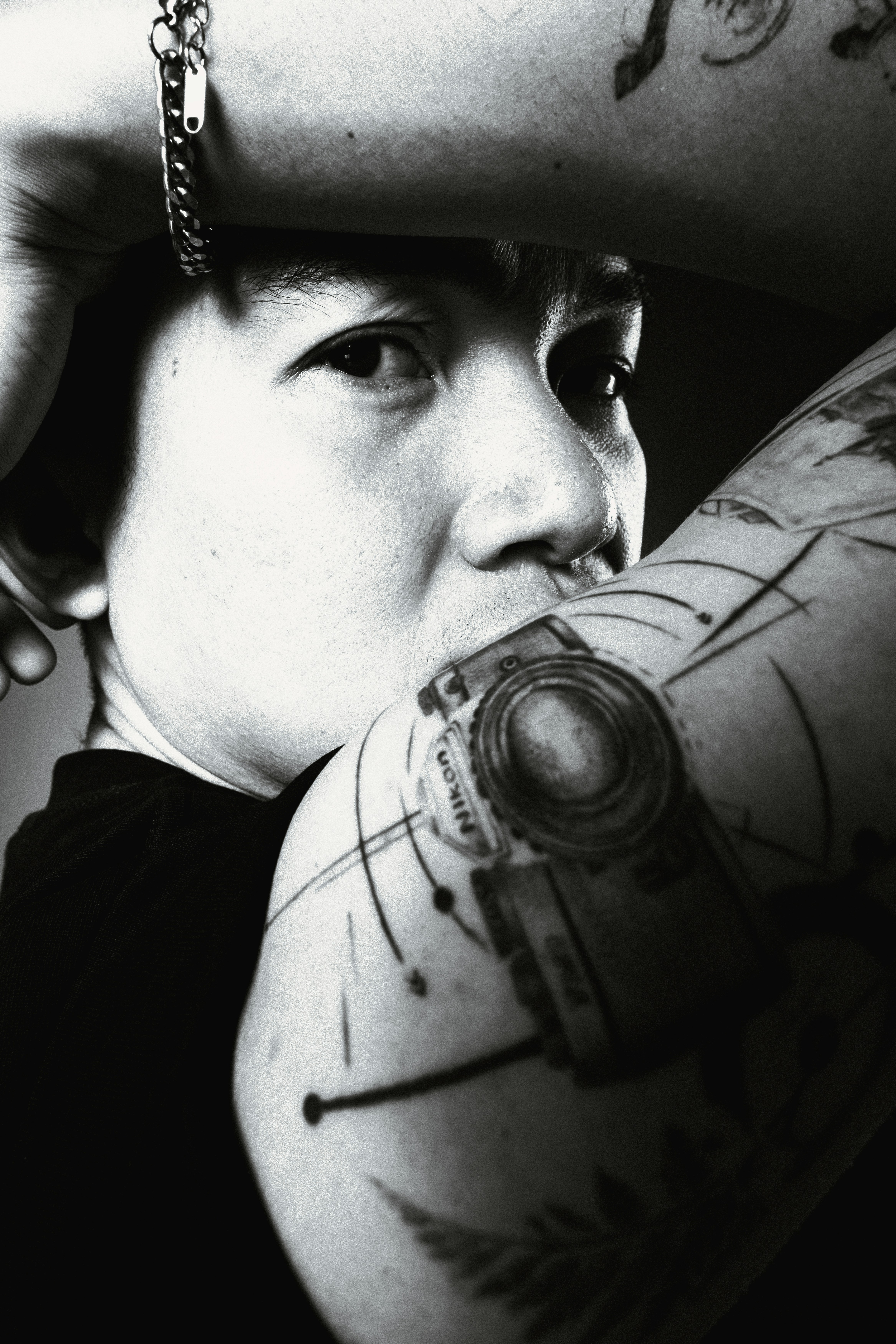 Inked Gaze: A Quiet Moment of Shielded Identity