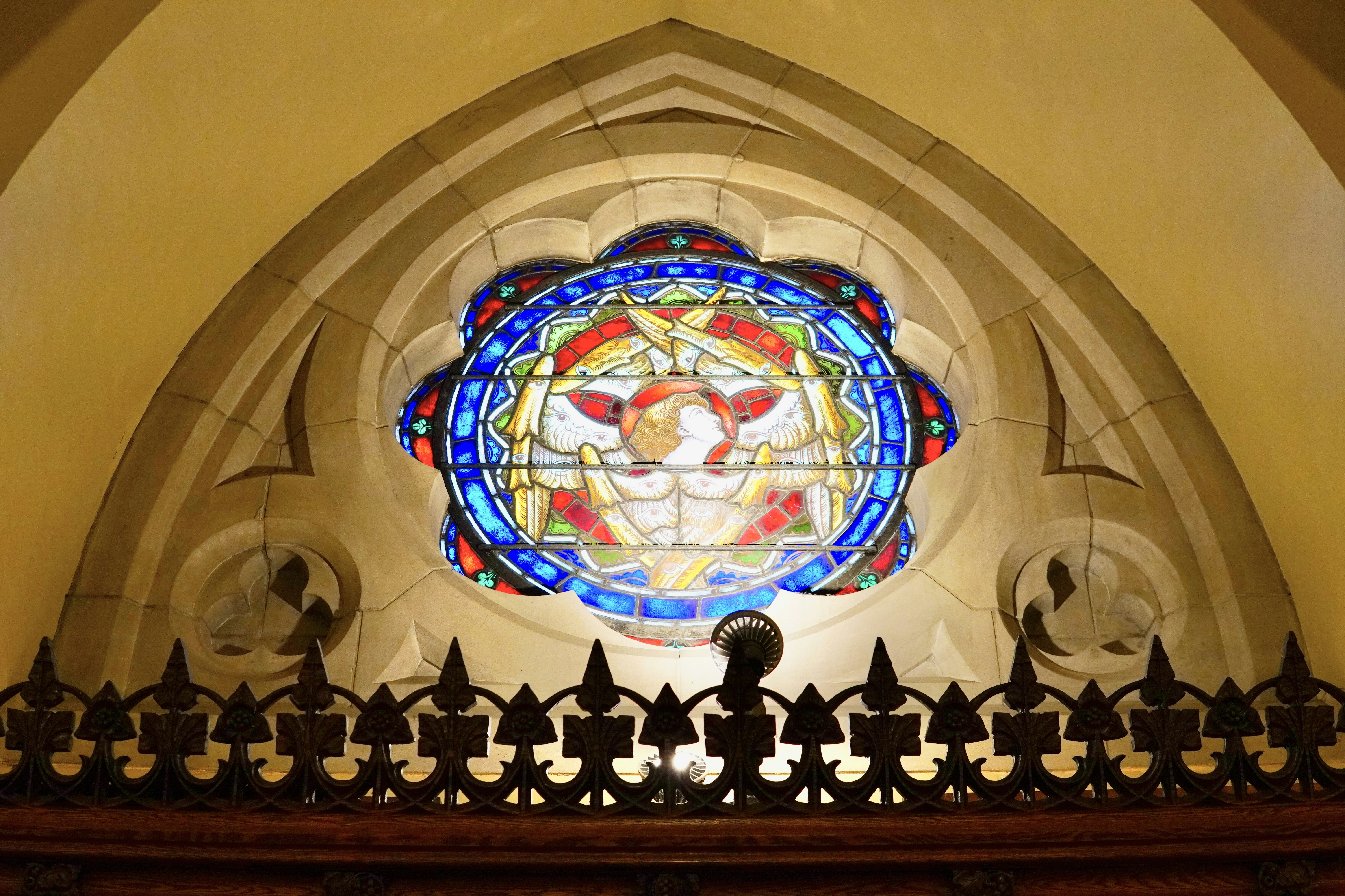 Stained Glass Reverie Over a Silhouetted Fence