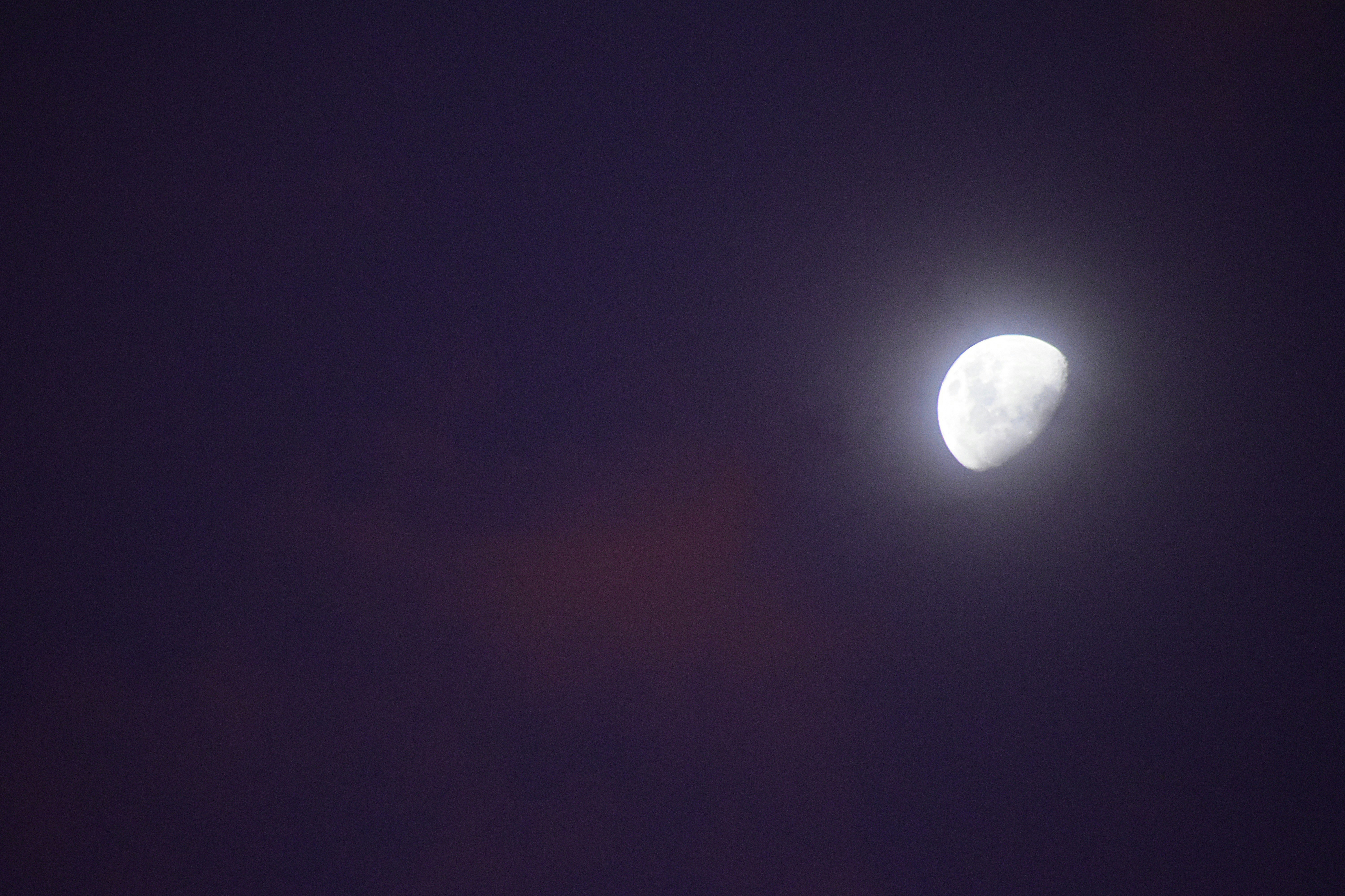 Moonlit Wisp: A Pale Crescent in Quiet Night
