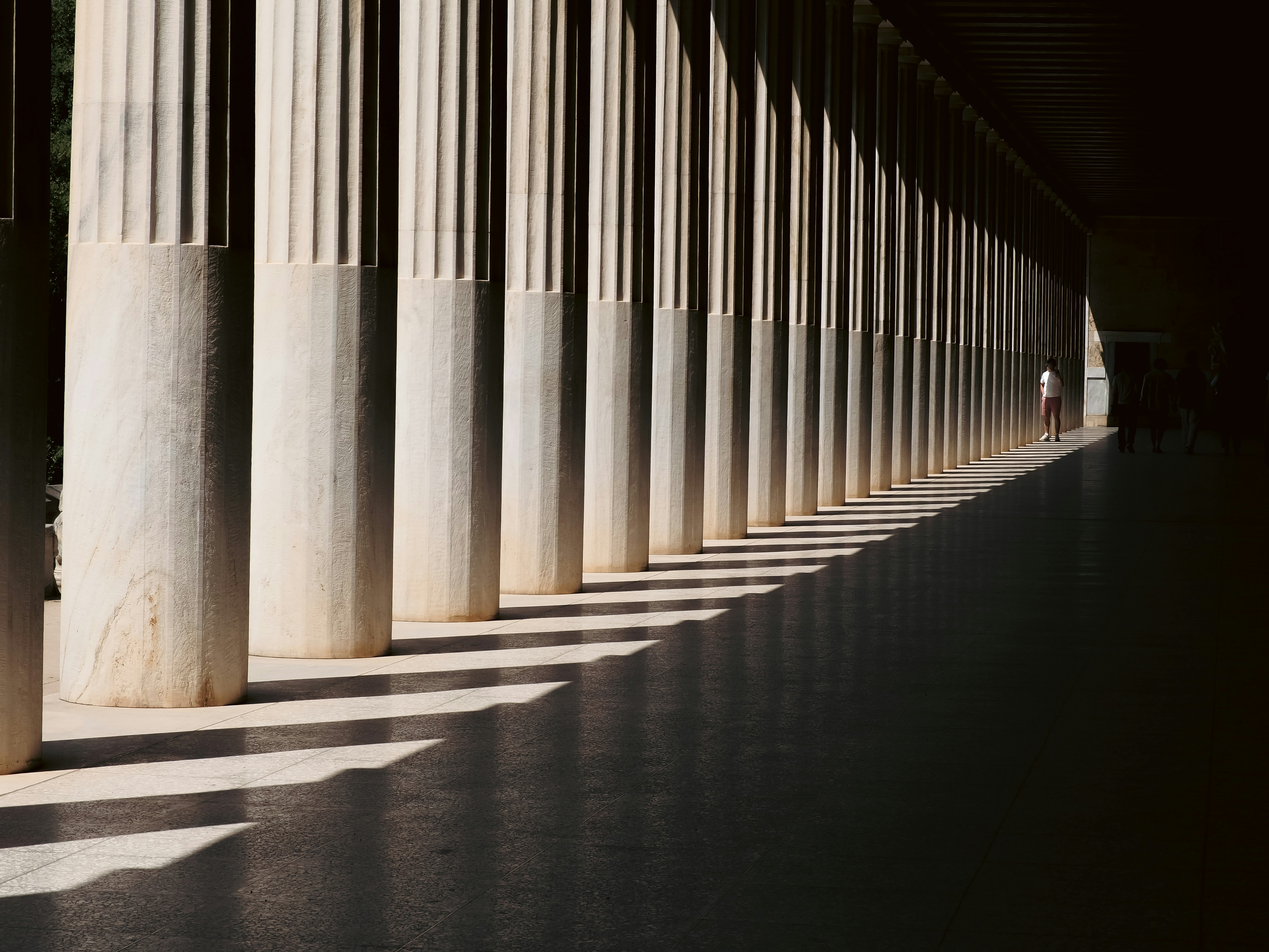 Long Corridor of Pillars: Light and Shadow in Repetition