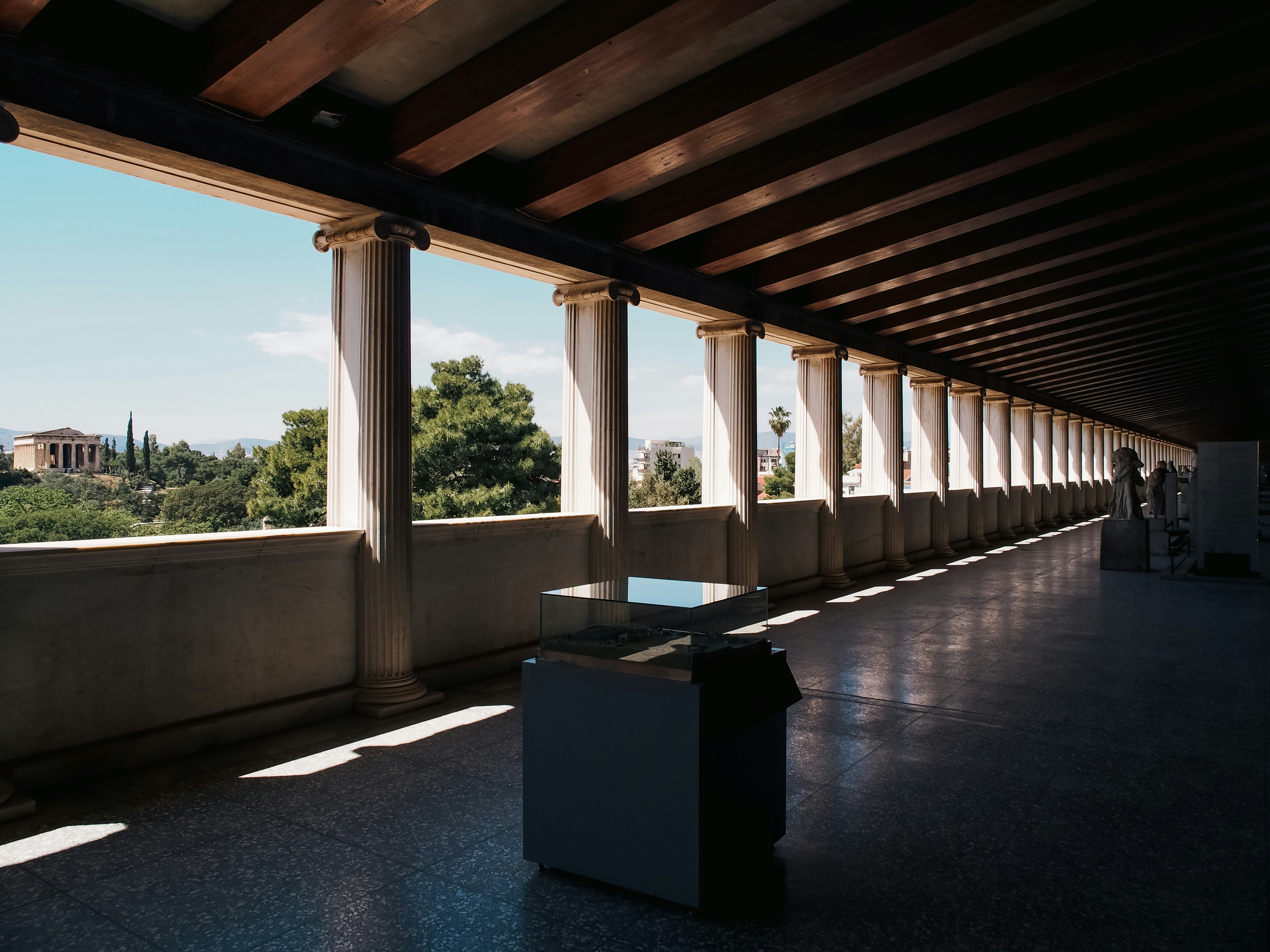Colonnade Corridor: Light, Shadow, and Quiet Perspective