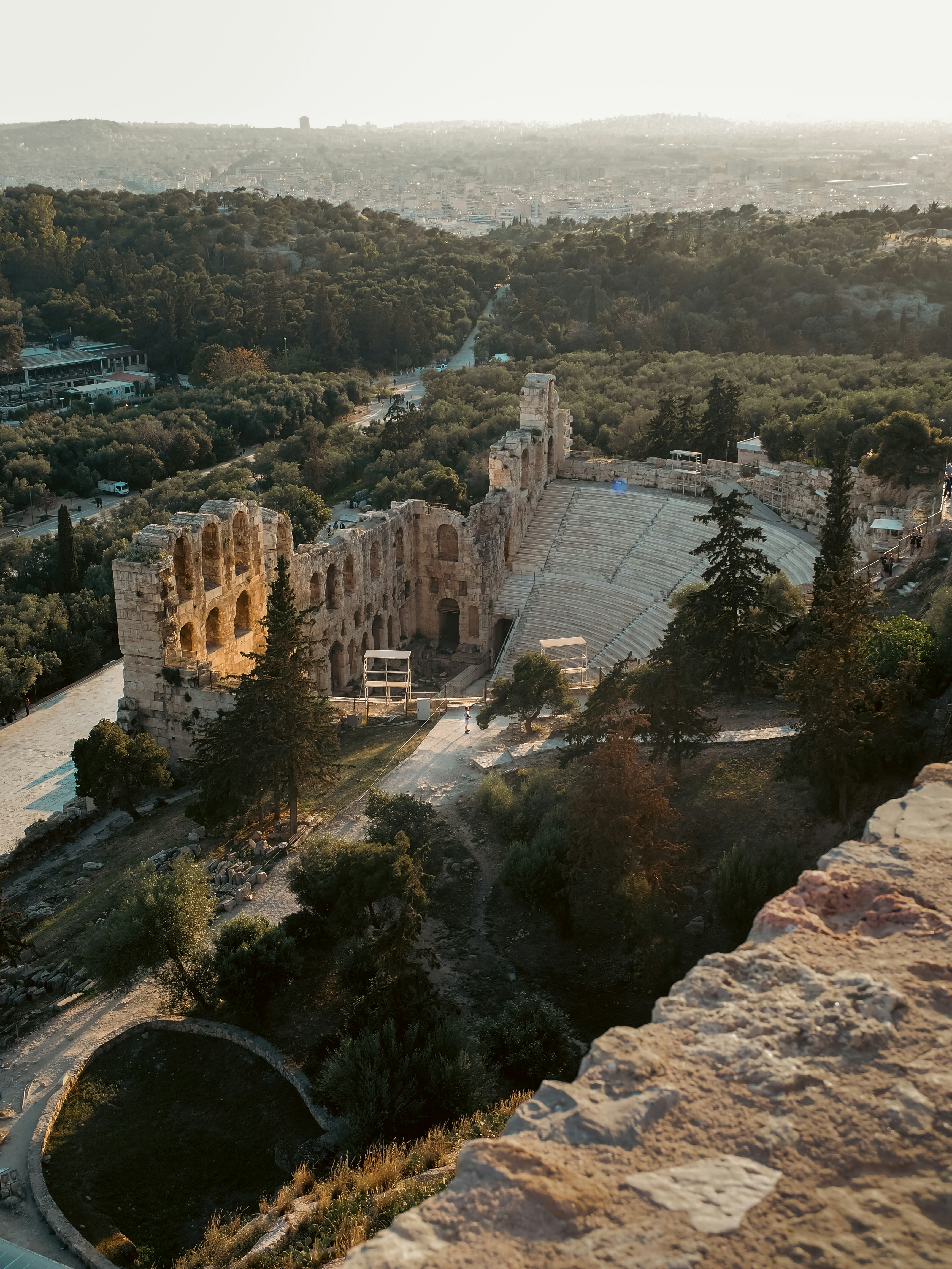 Ancient Arena among a sea of trees at golden hour