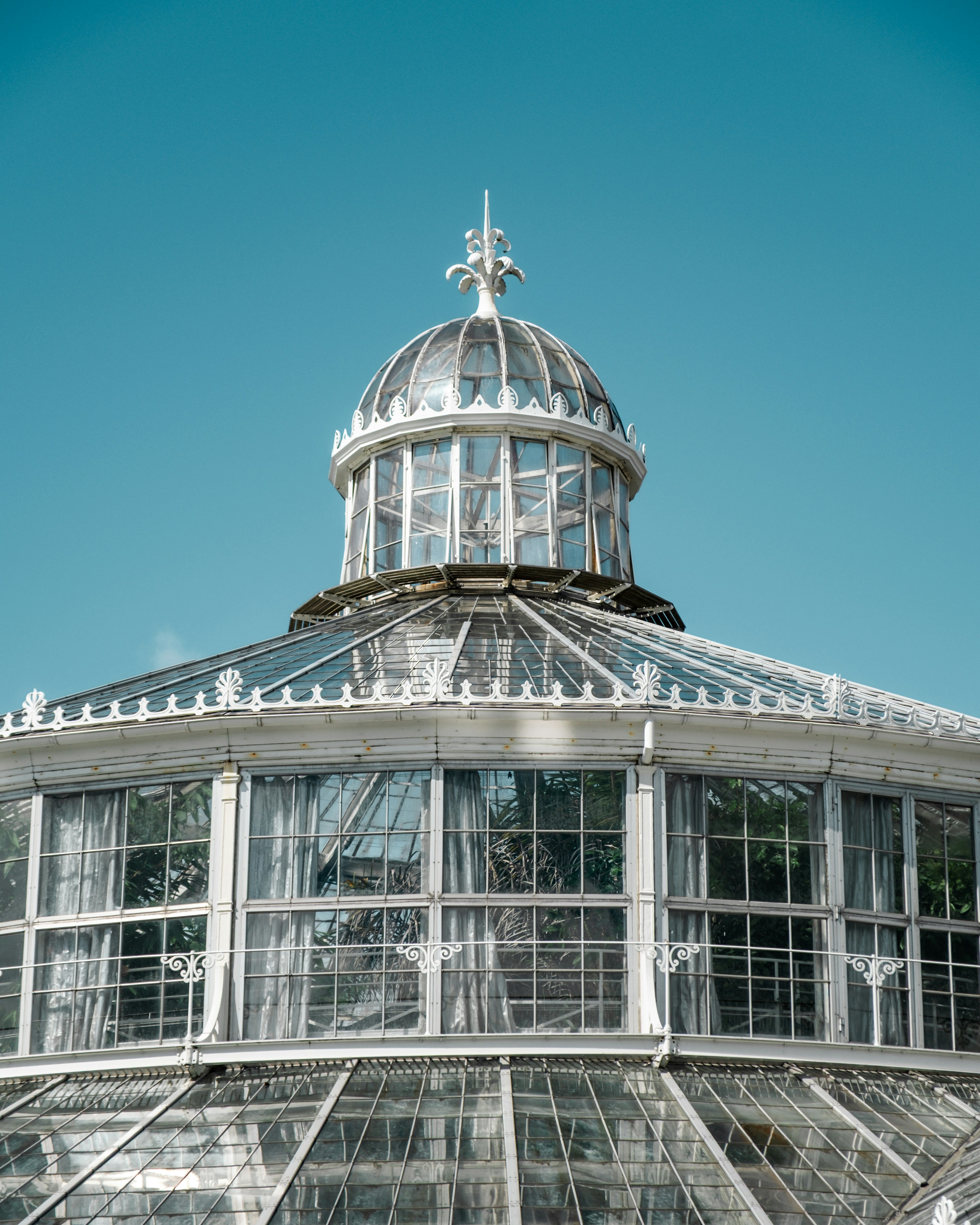 Crystal Dome and Ironwork: A Conservatory Crowned by Glass