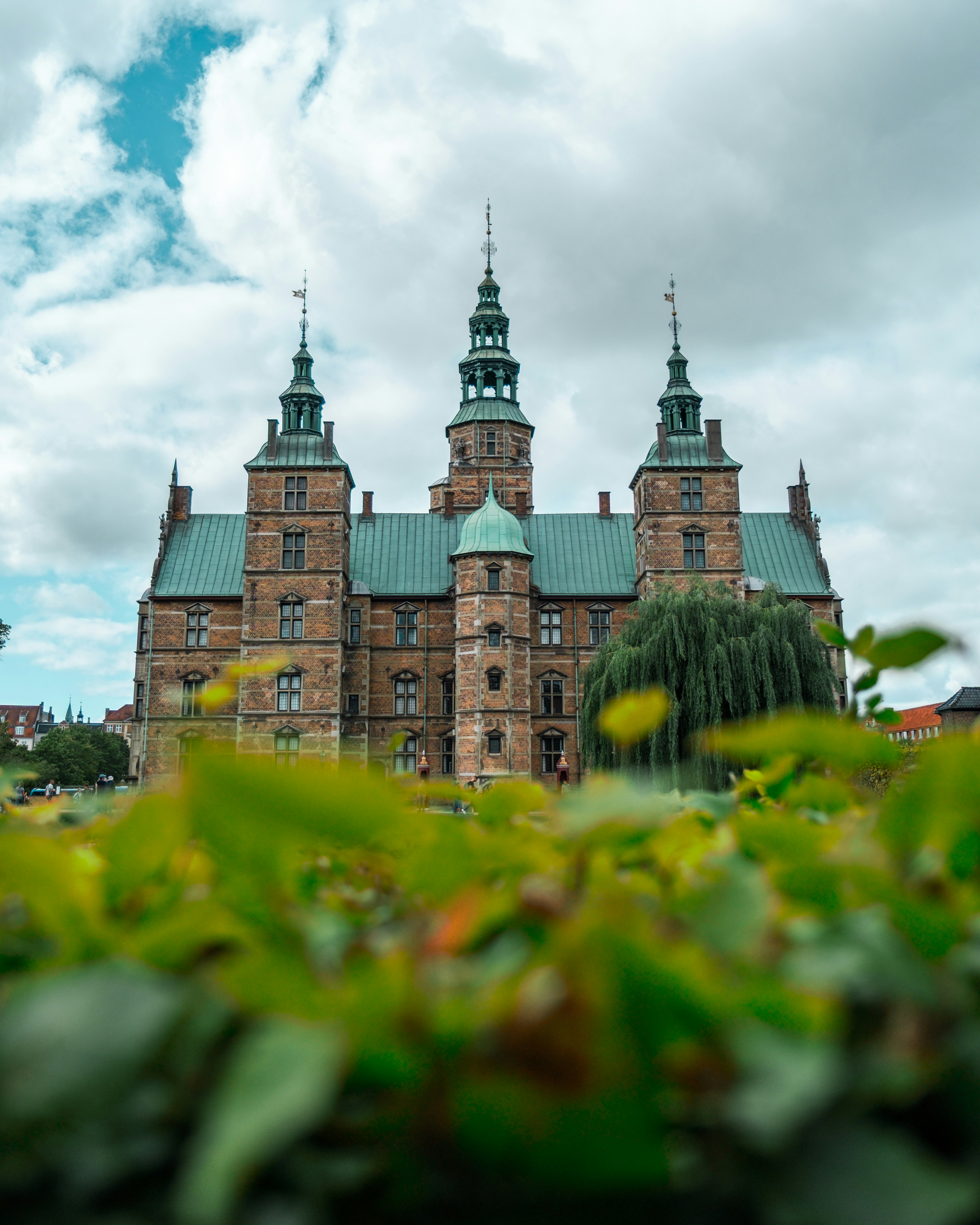 Renaissance Castle Rising Above a Green Forecourt
