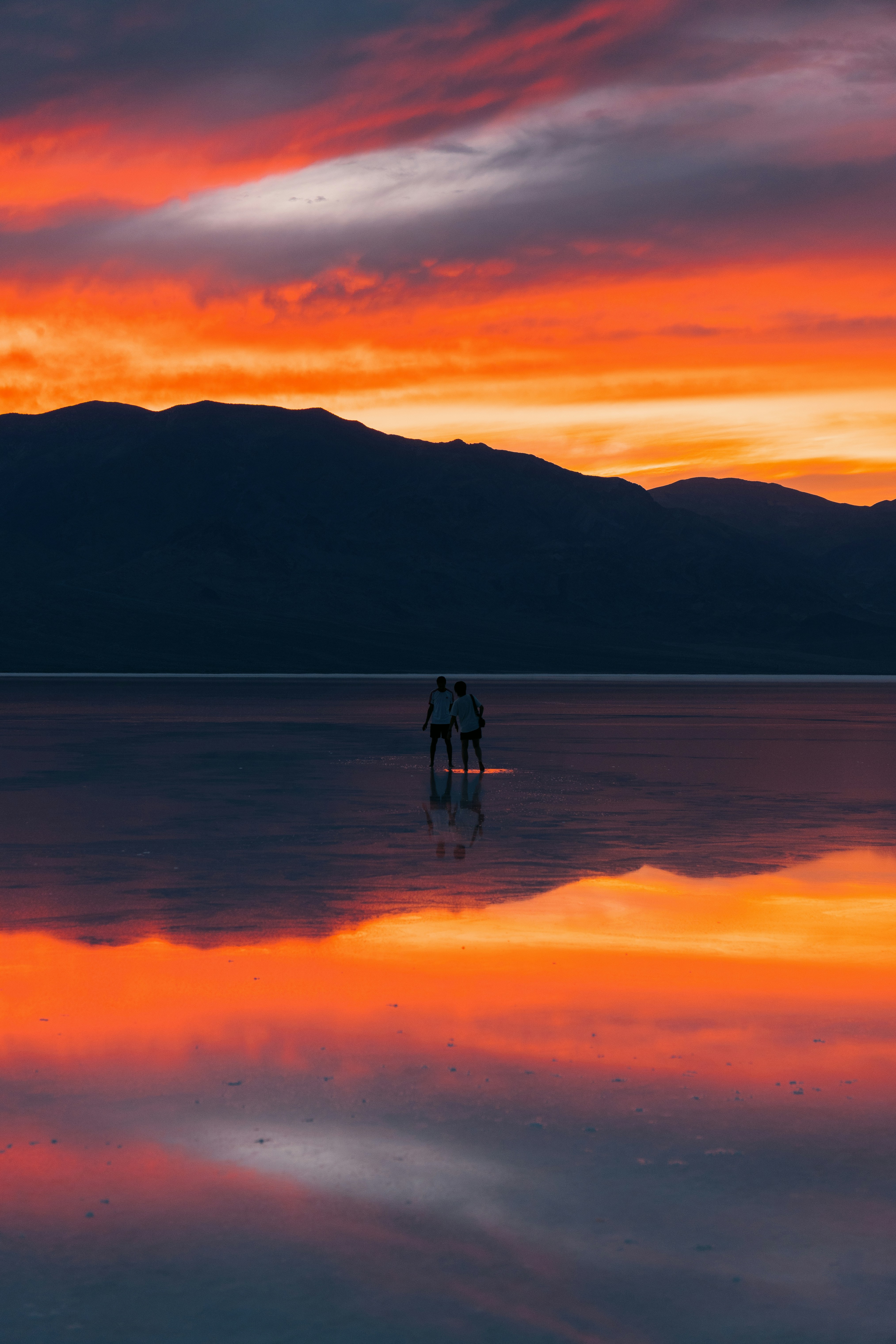 Silhouetted Couple at Sunset on a Mirror-Ted Lake