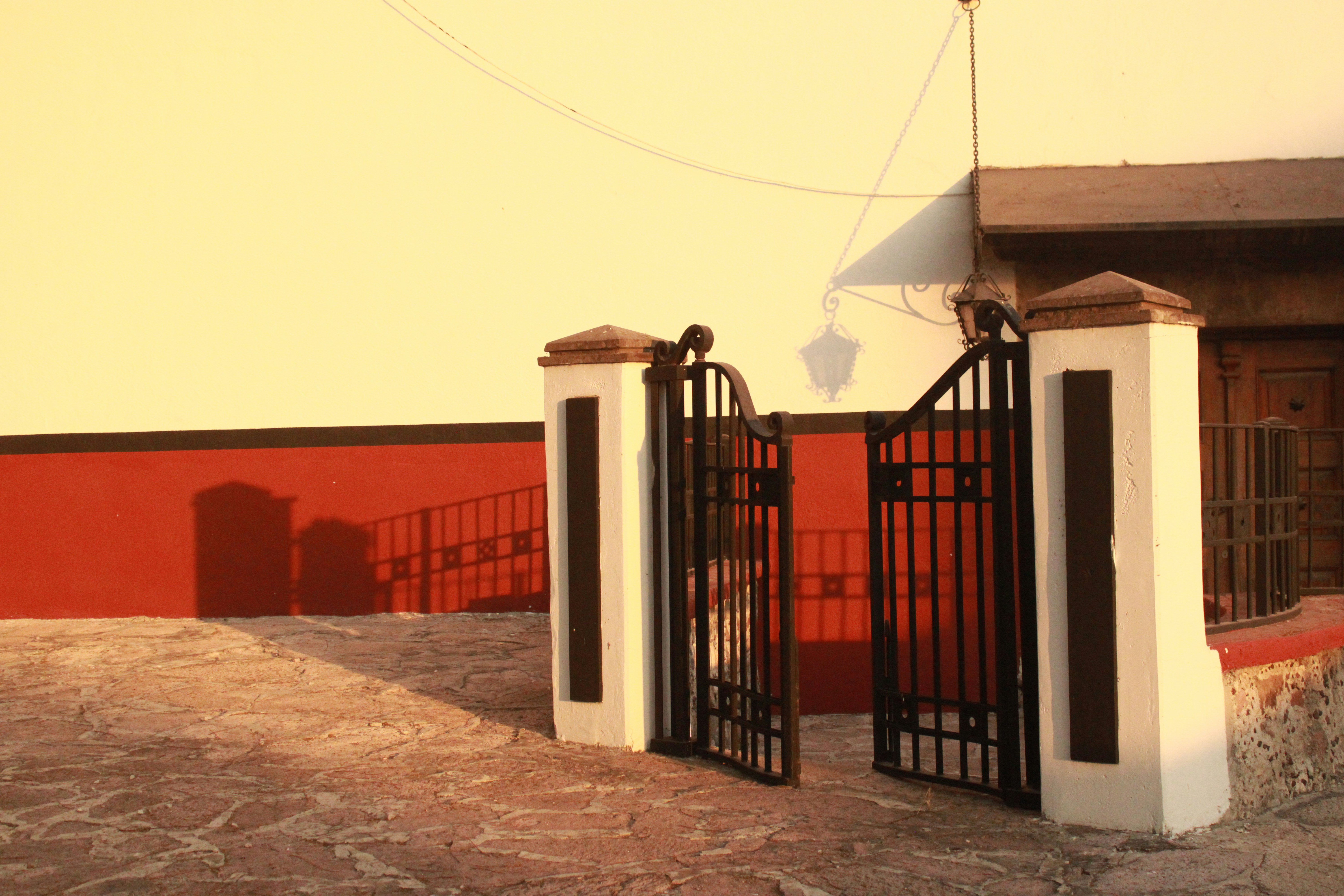 Open Gate, Warm Facade: A Quiet Courtyard Moment
