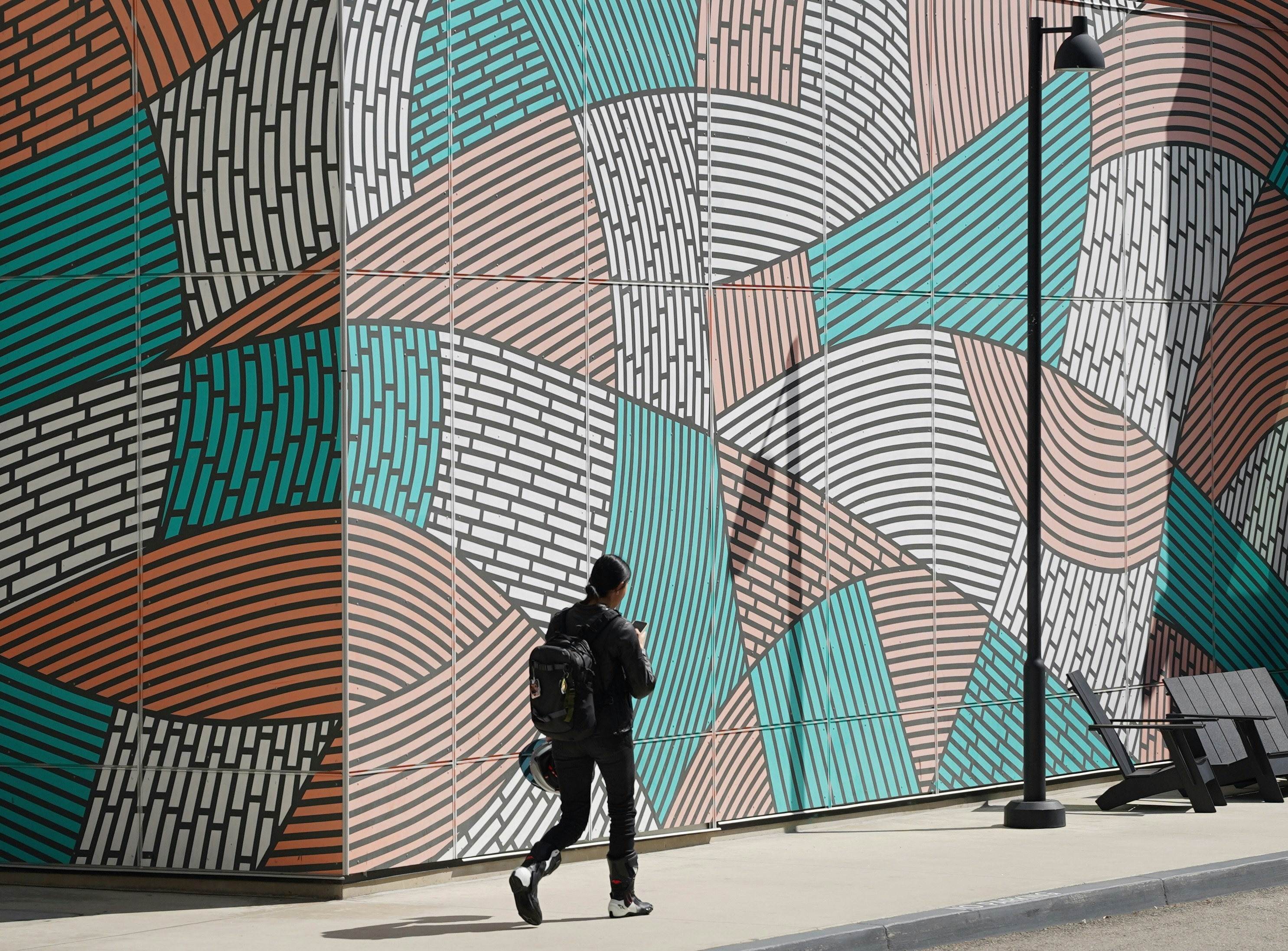 Runner in Front of a Geometric Wall