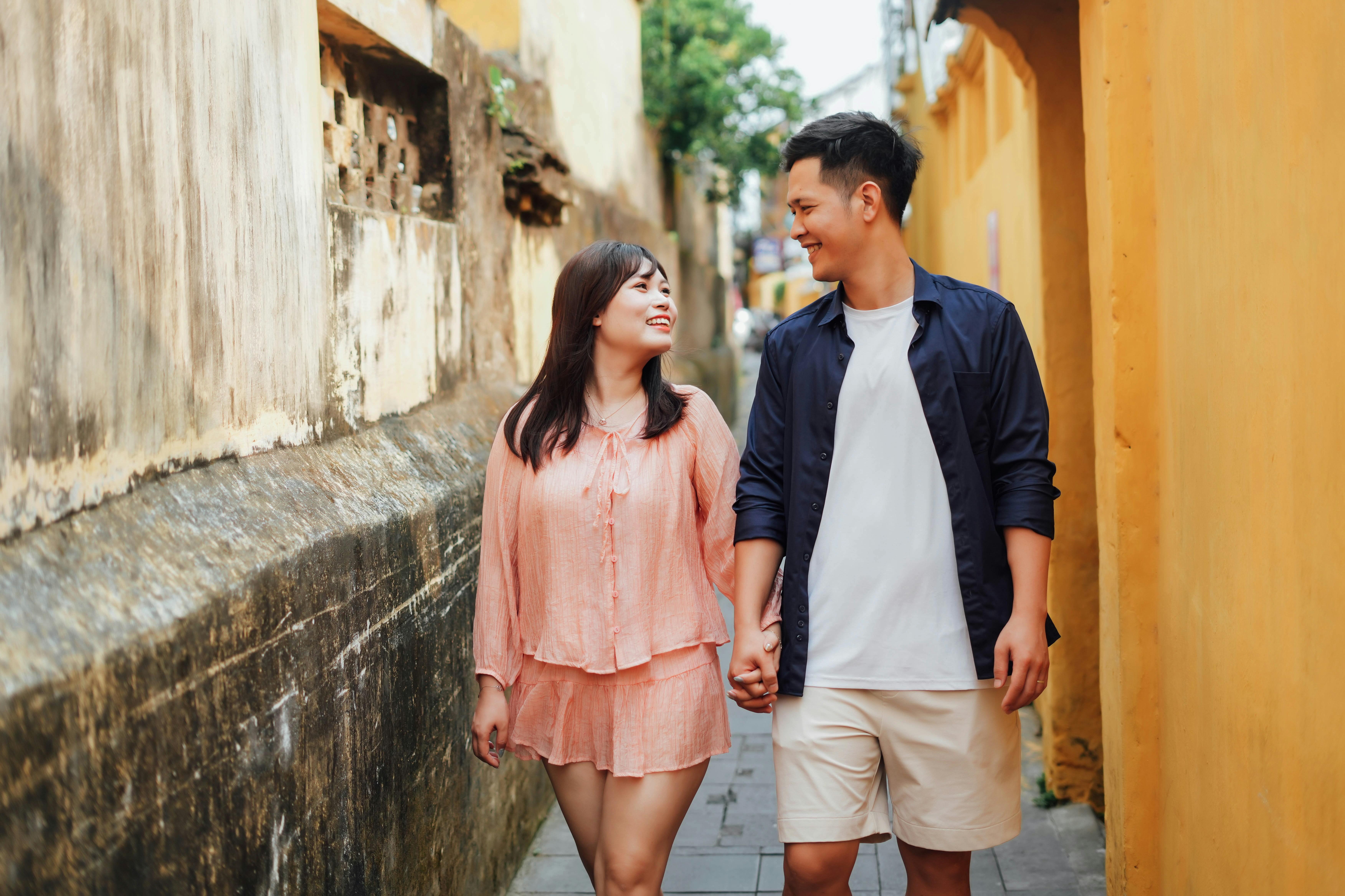 Holding Hands Through a Sunlit Alley