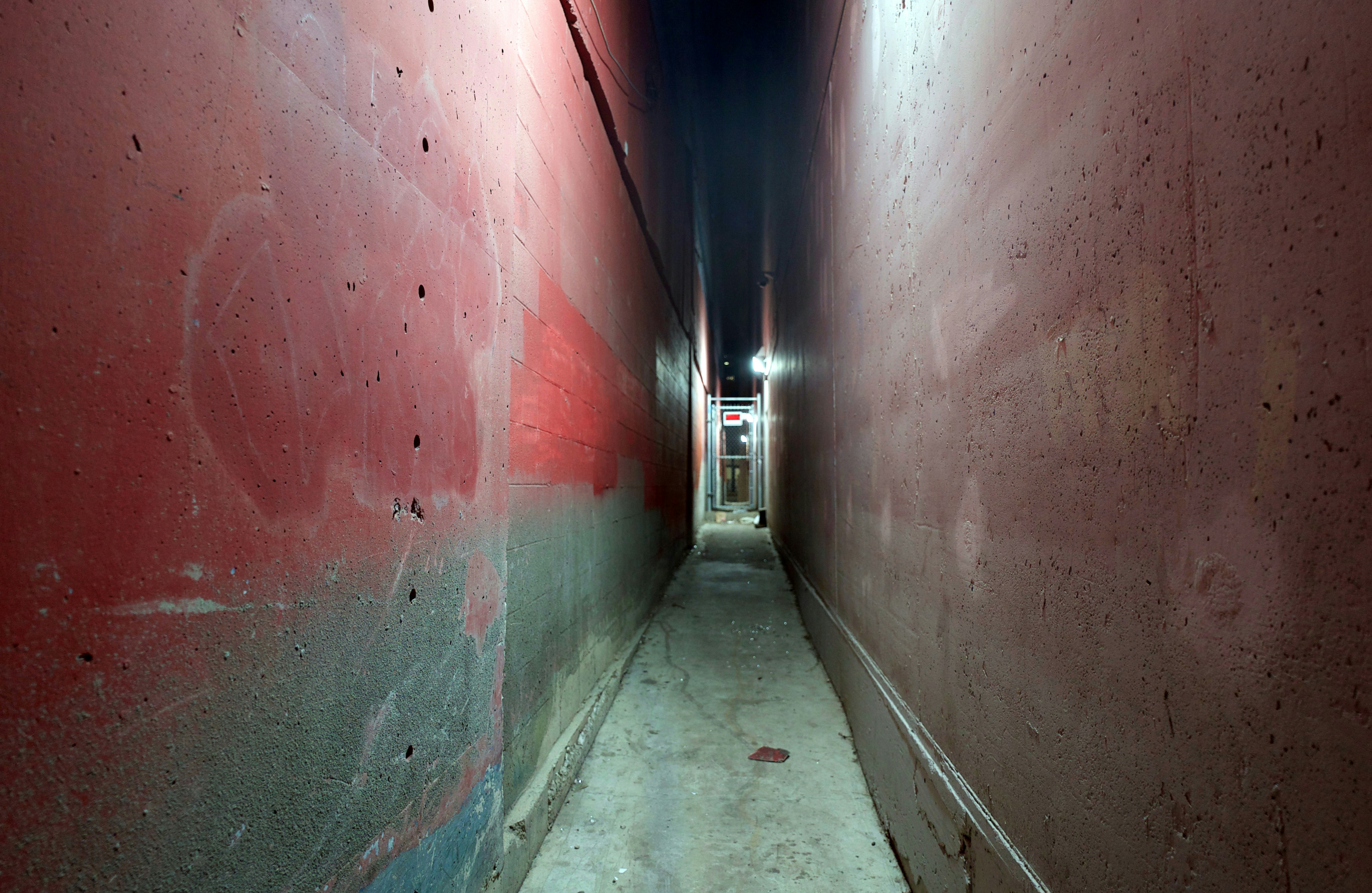 Narrow Red Corridor to a Distant Light