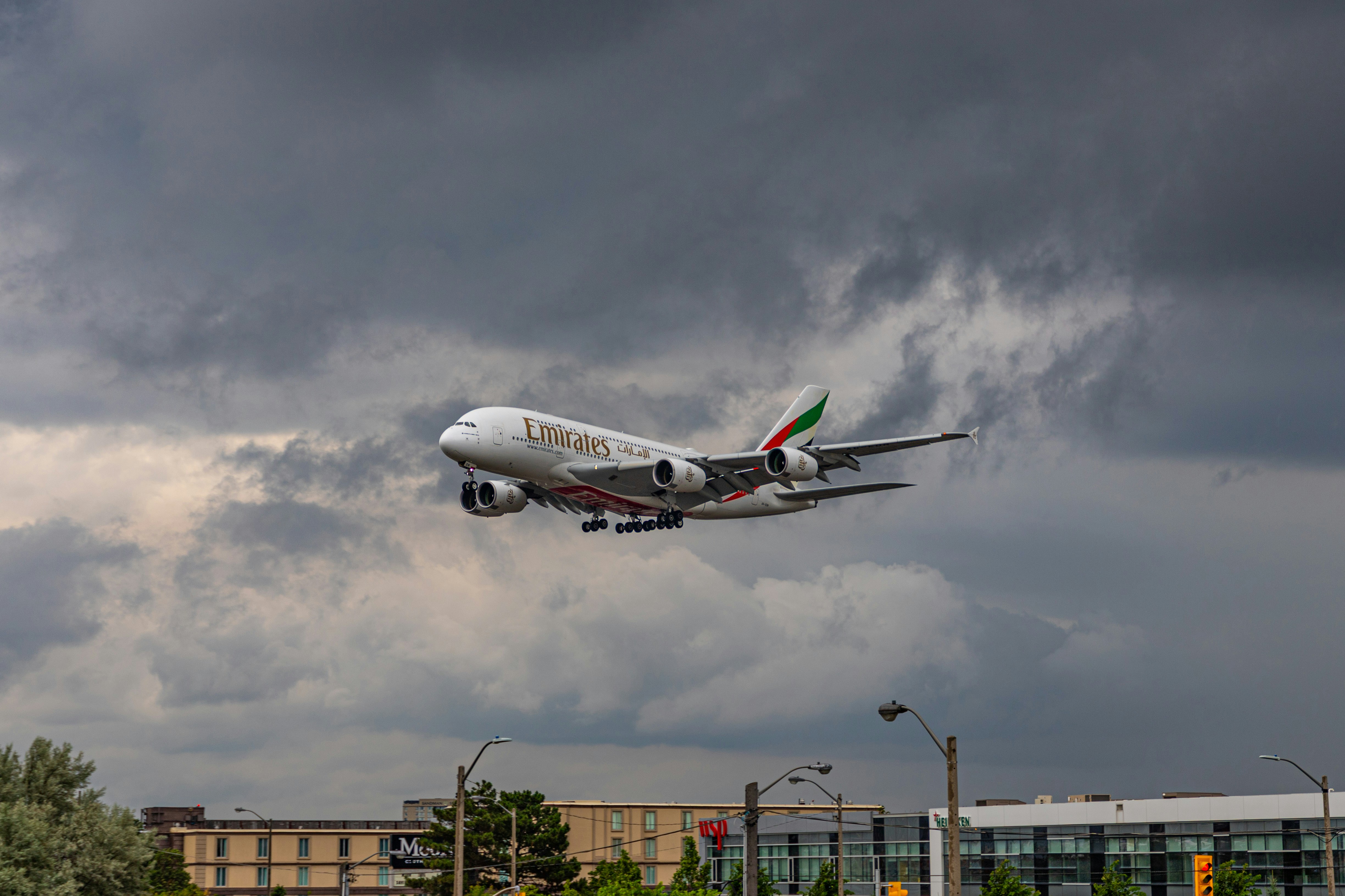 Embraer of the Horizon: Emirates A380 Lifts Over a Quiet City
