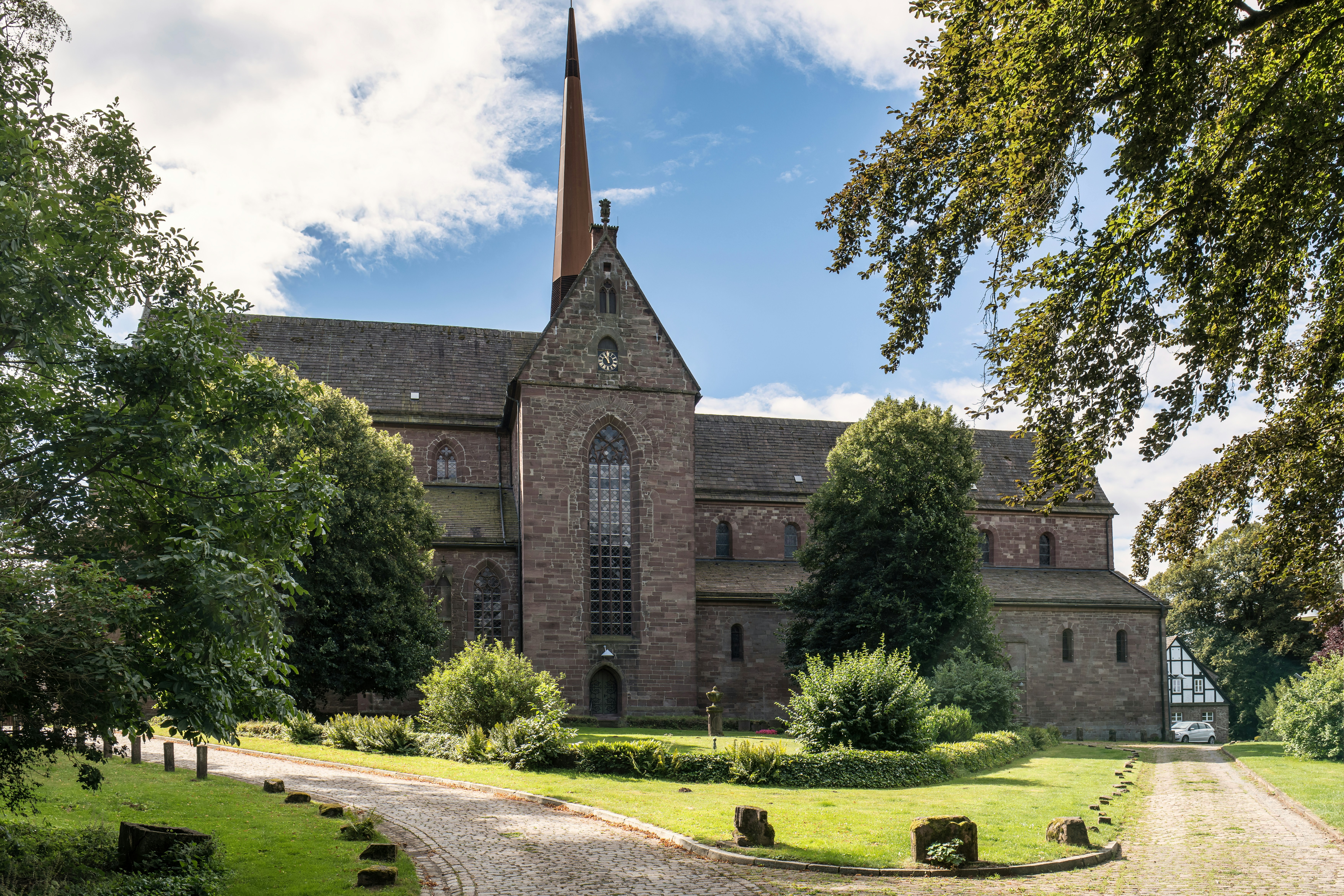Stately Abbey in a Sunlit Park