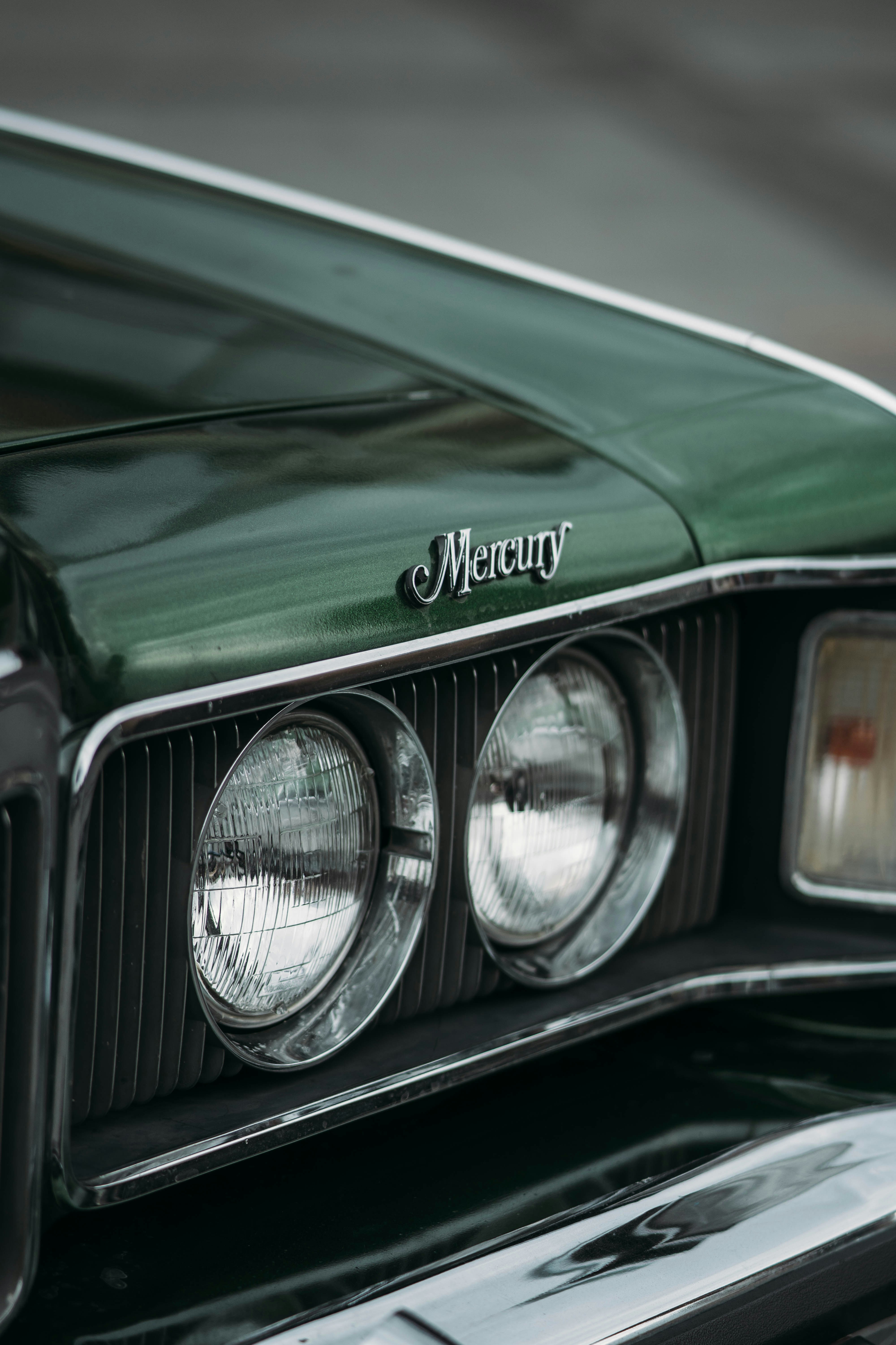 Green Mercury Front Grille: Classic Car Portrait