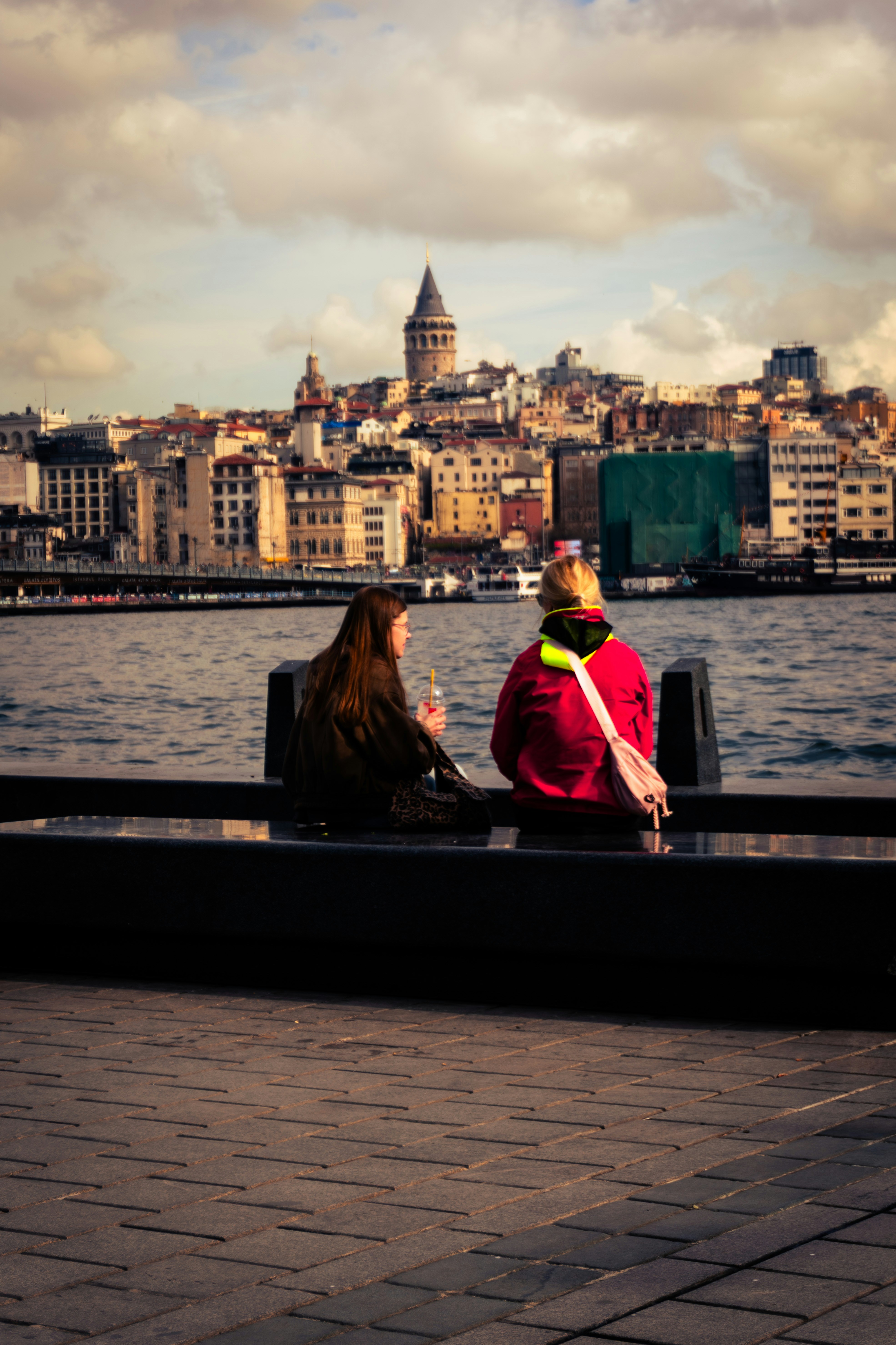 City by the Waterfront: Two Friends in Conversation with a Historic Skyline
