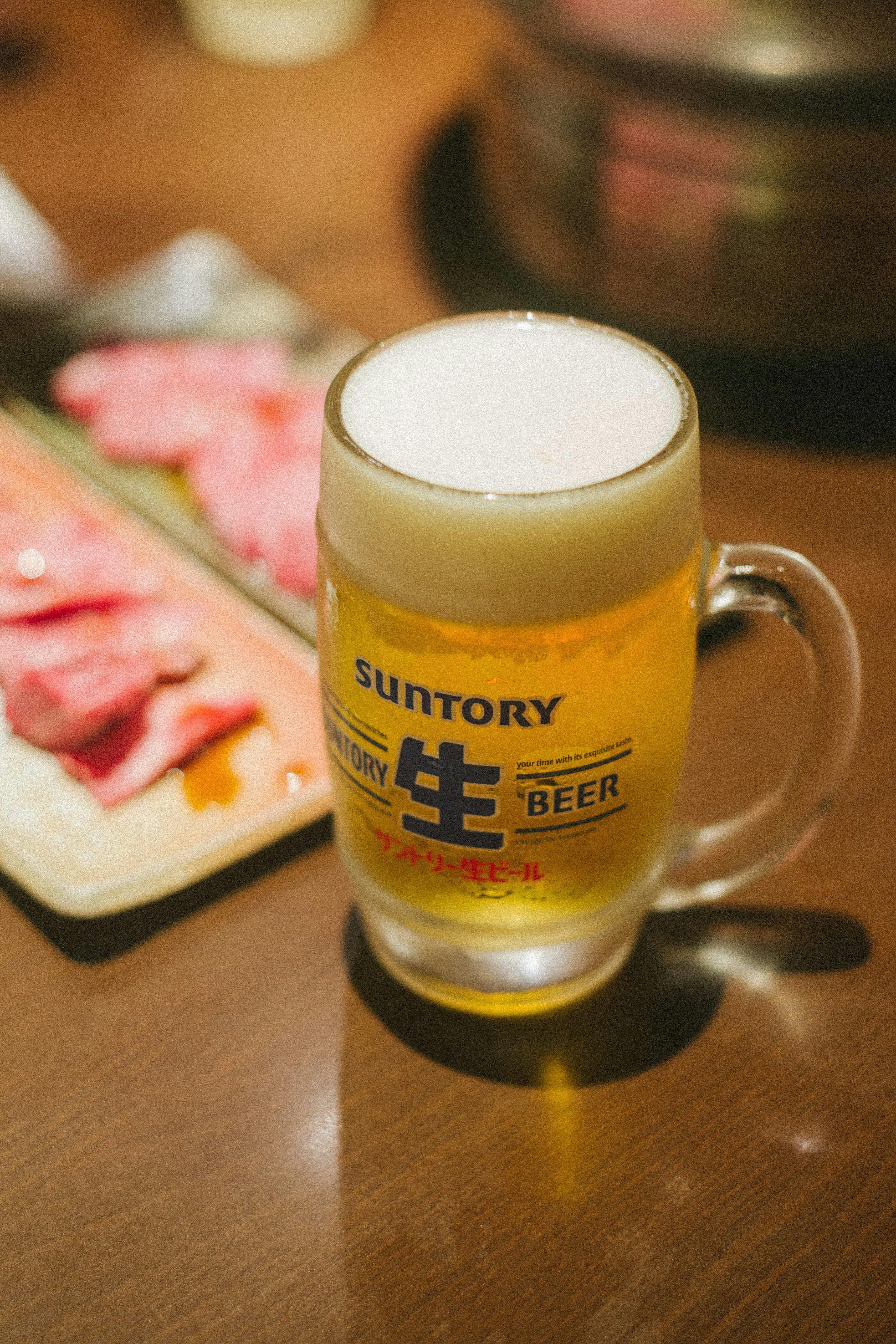 Golden Toast: A Frothy Beer Toast in a Dimly Lit Nook
