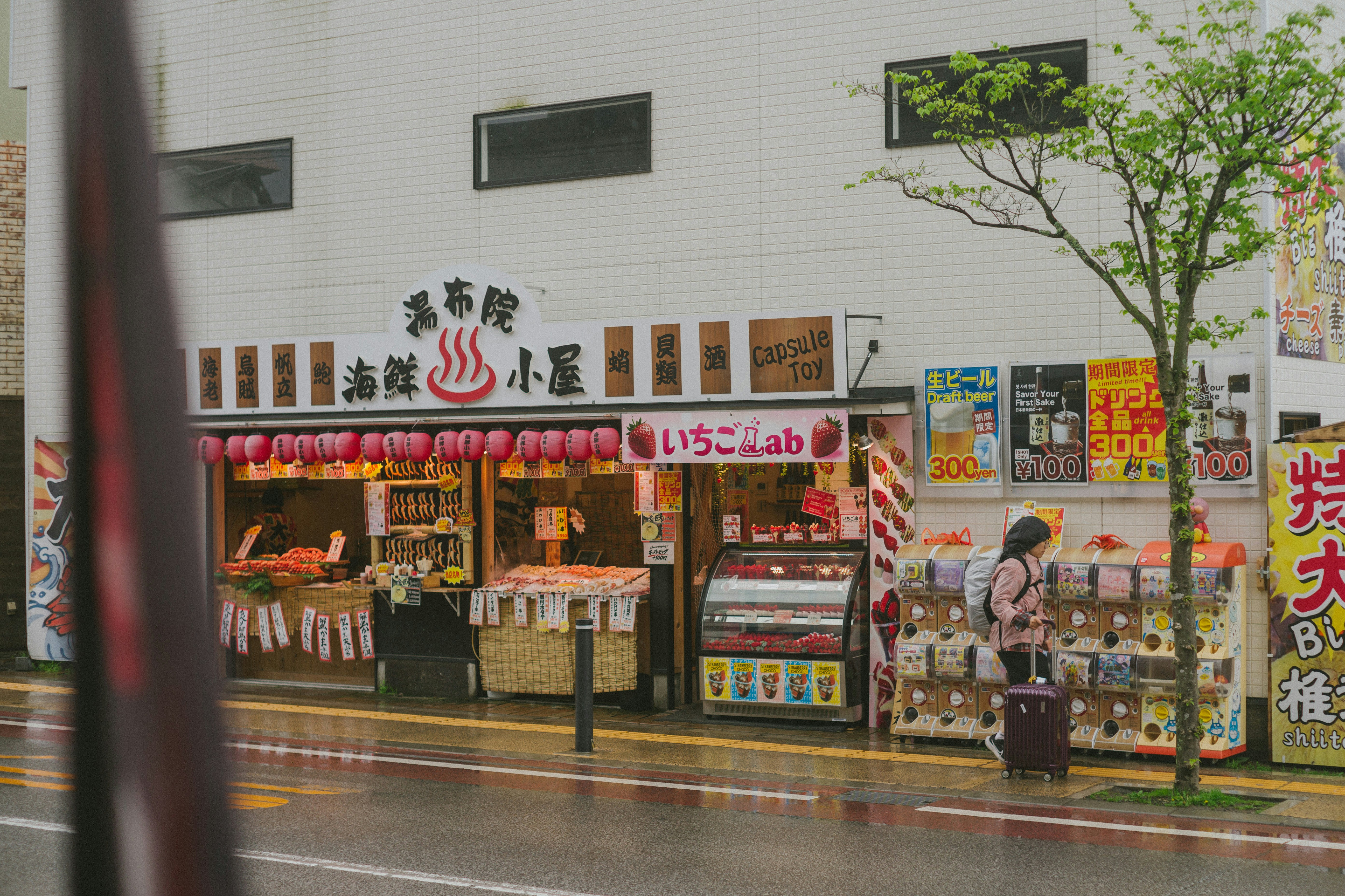 Streetfront Market Neon: A Quiet Rainy Day on a Japanese Alley