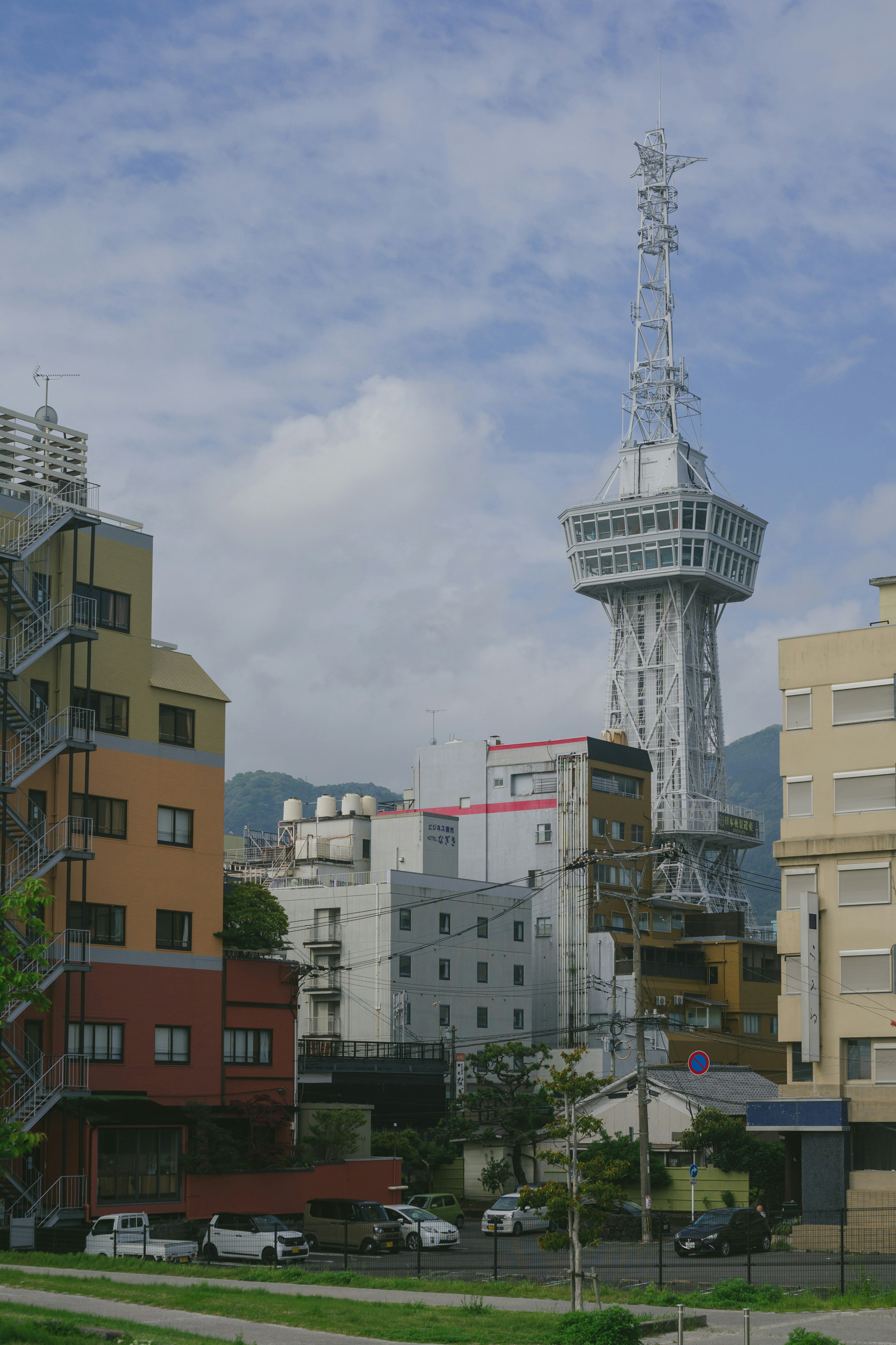 City Tower Overlook: A Towering Needle among Bright Facades