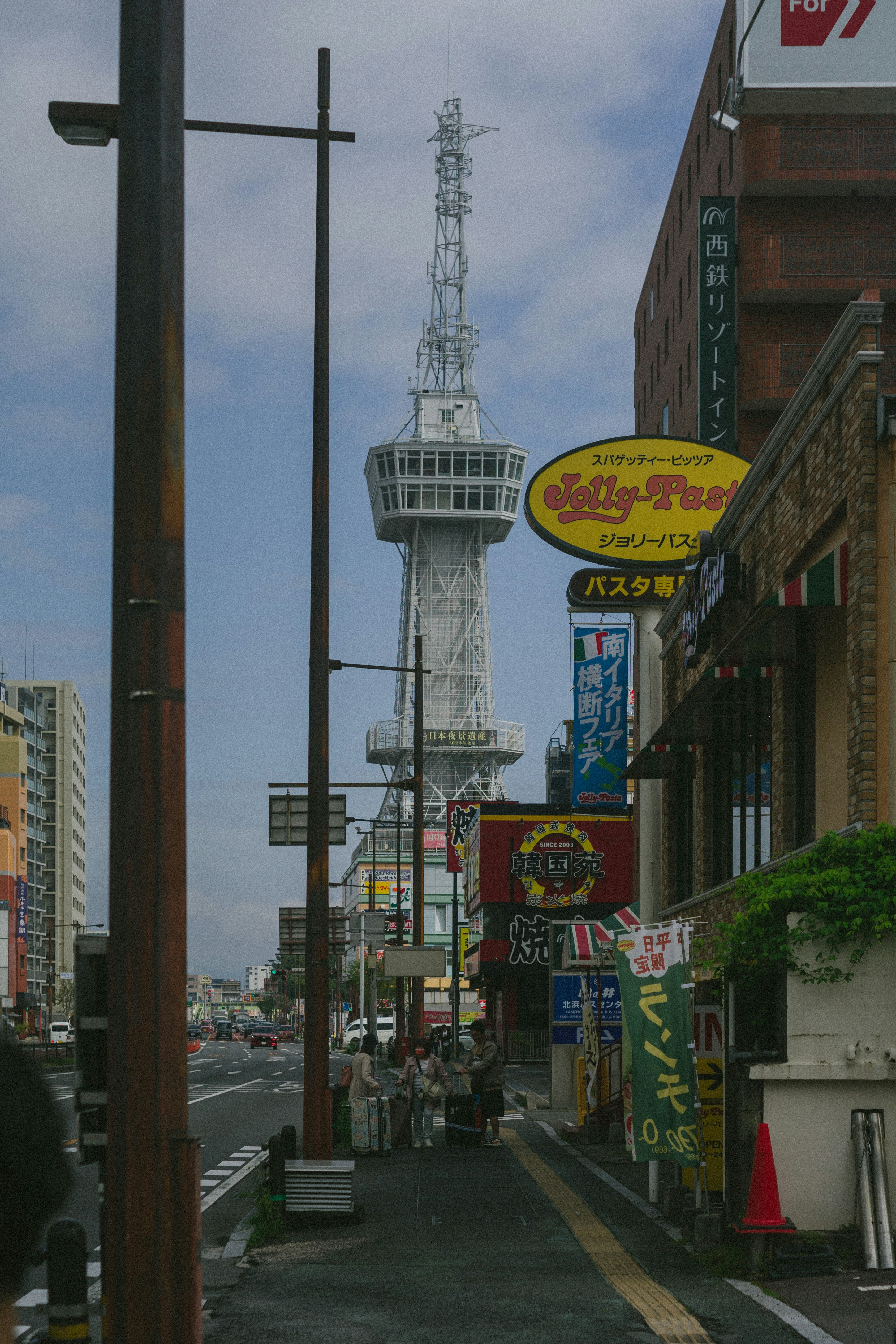 City Tower Through a Street of Signs