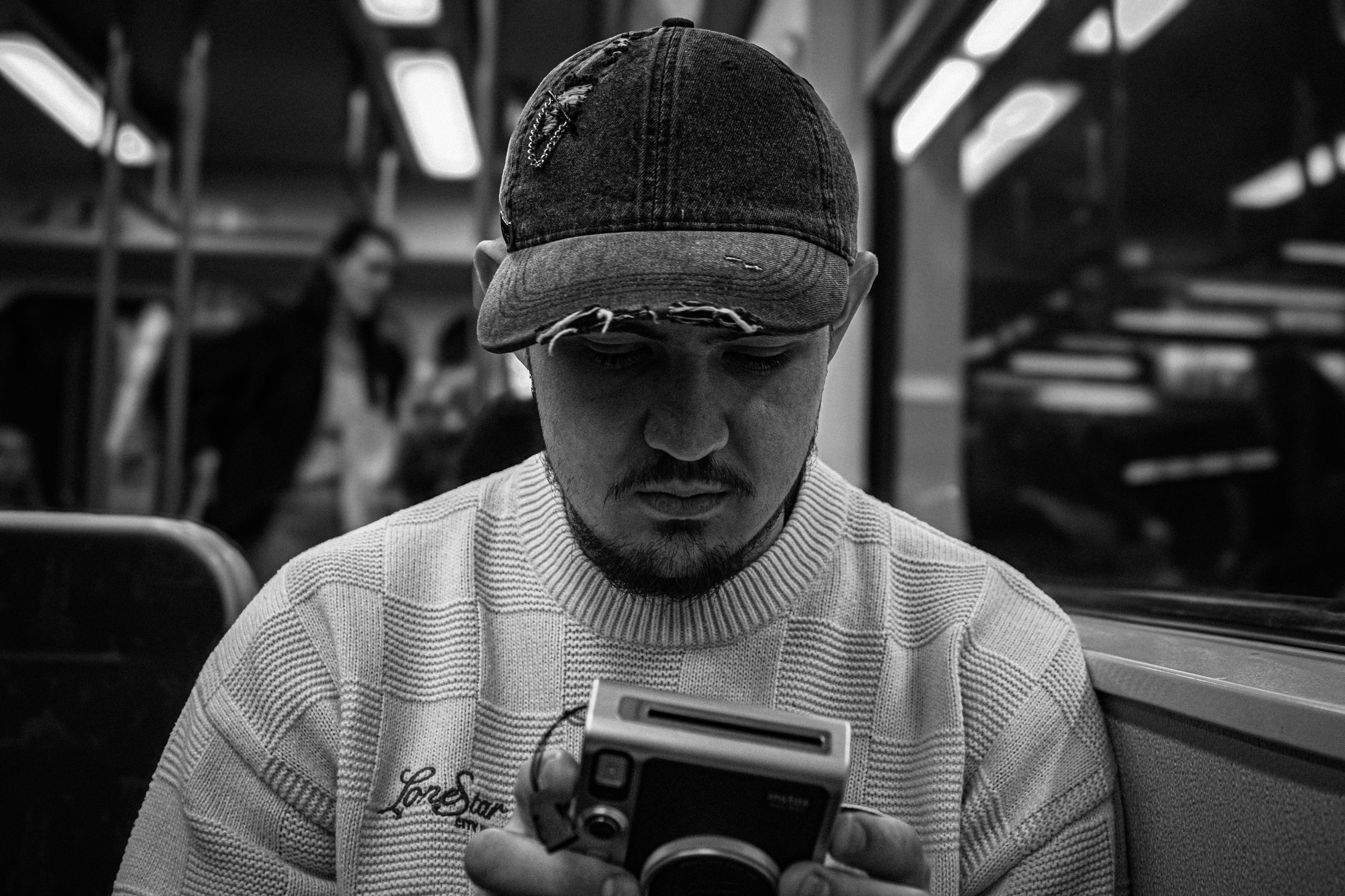 Nocturnal Glance: A Street Photographer's Quiet Moment