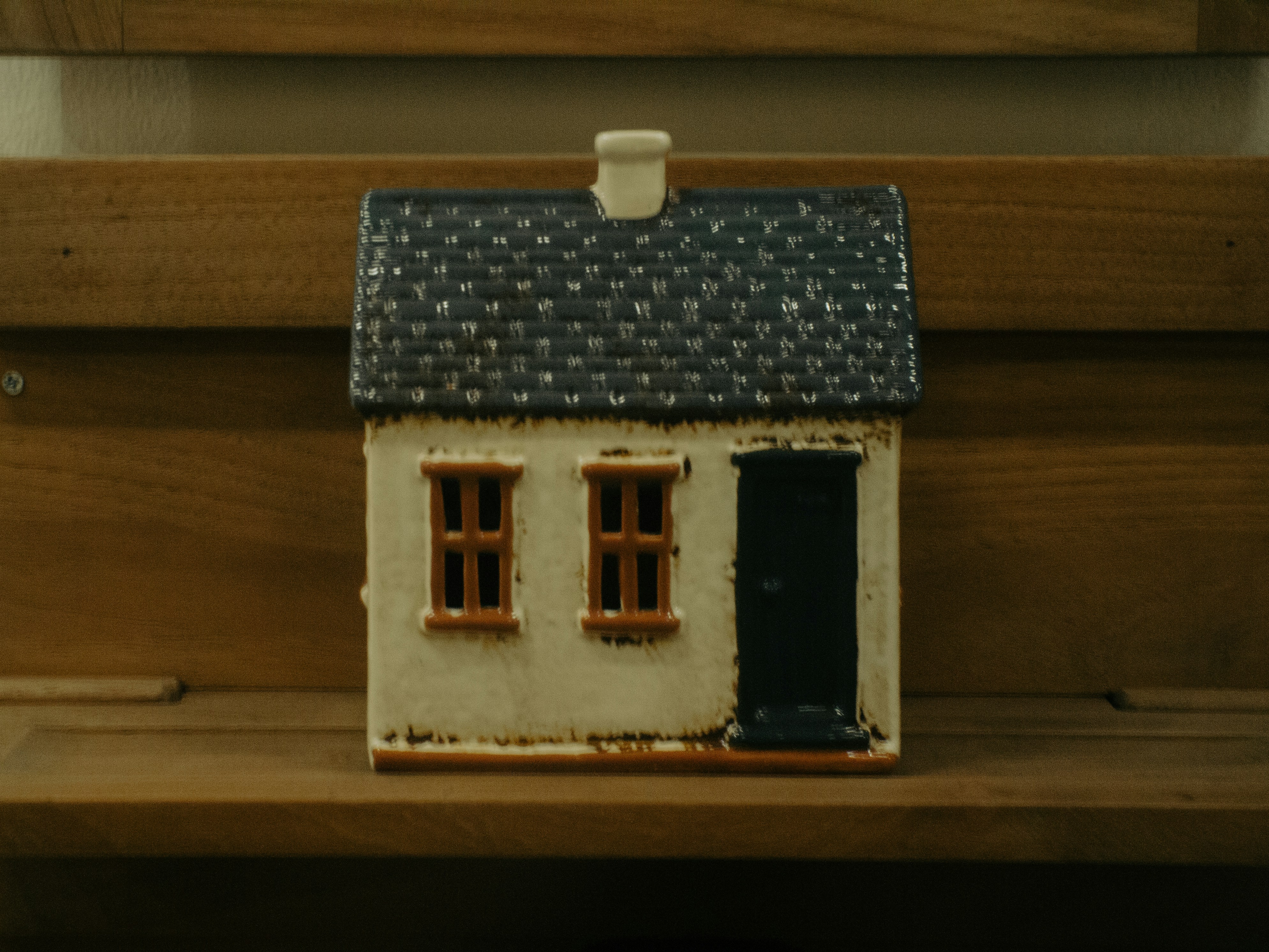 Cozy Cottage Miniature on a Wooden Shelf