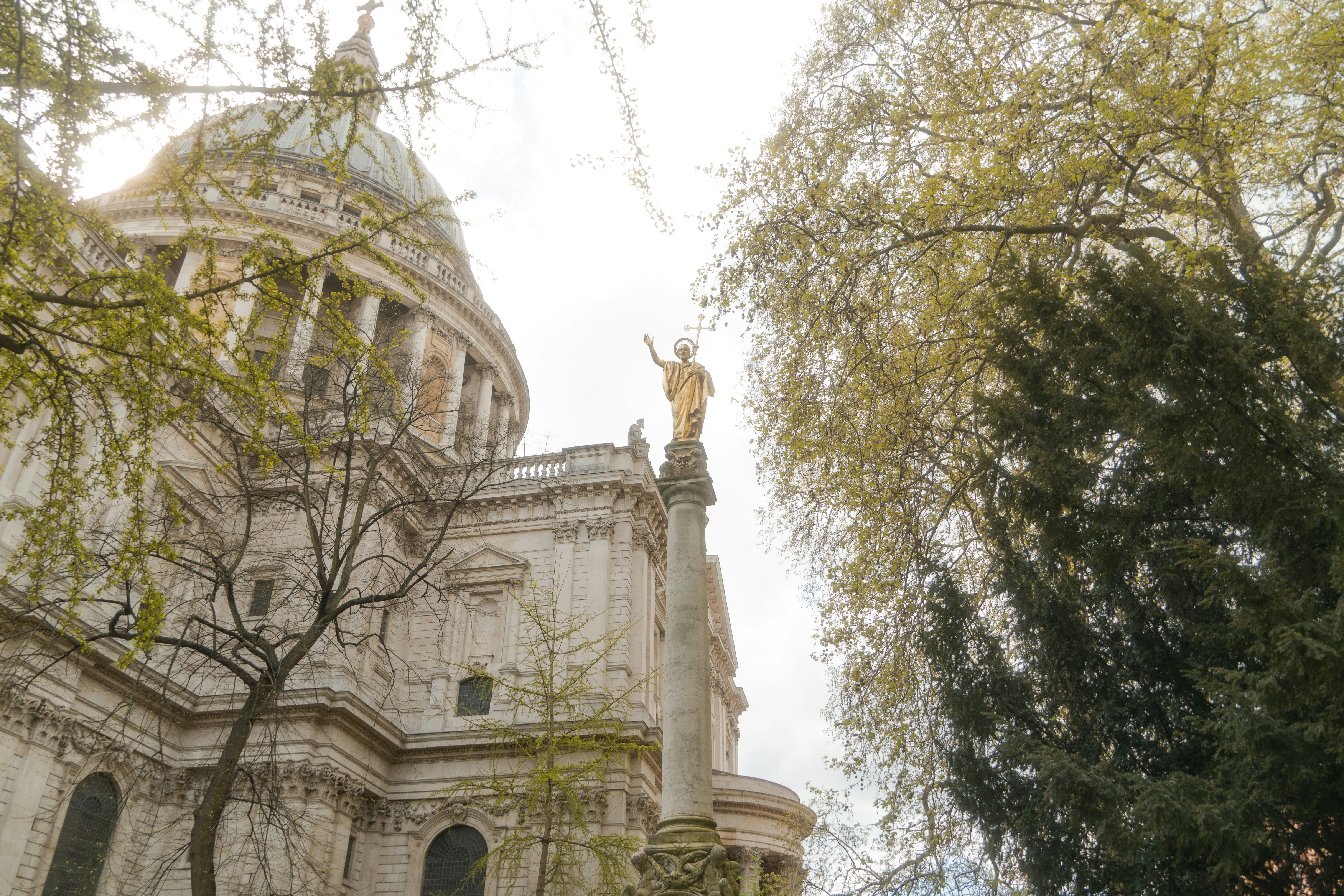 Statue of Victory overlooking a classical domed building