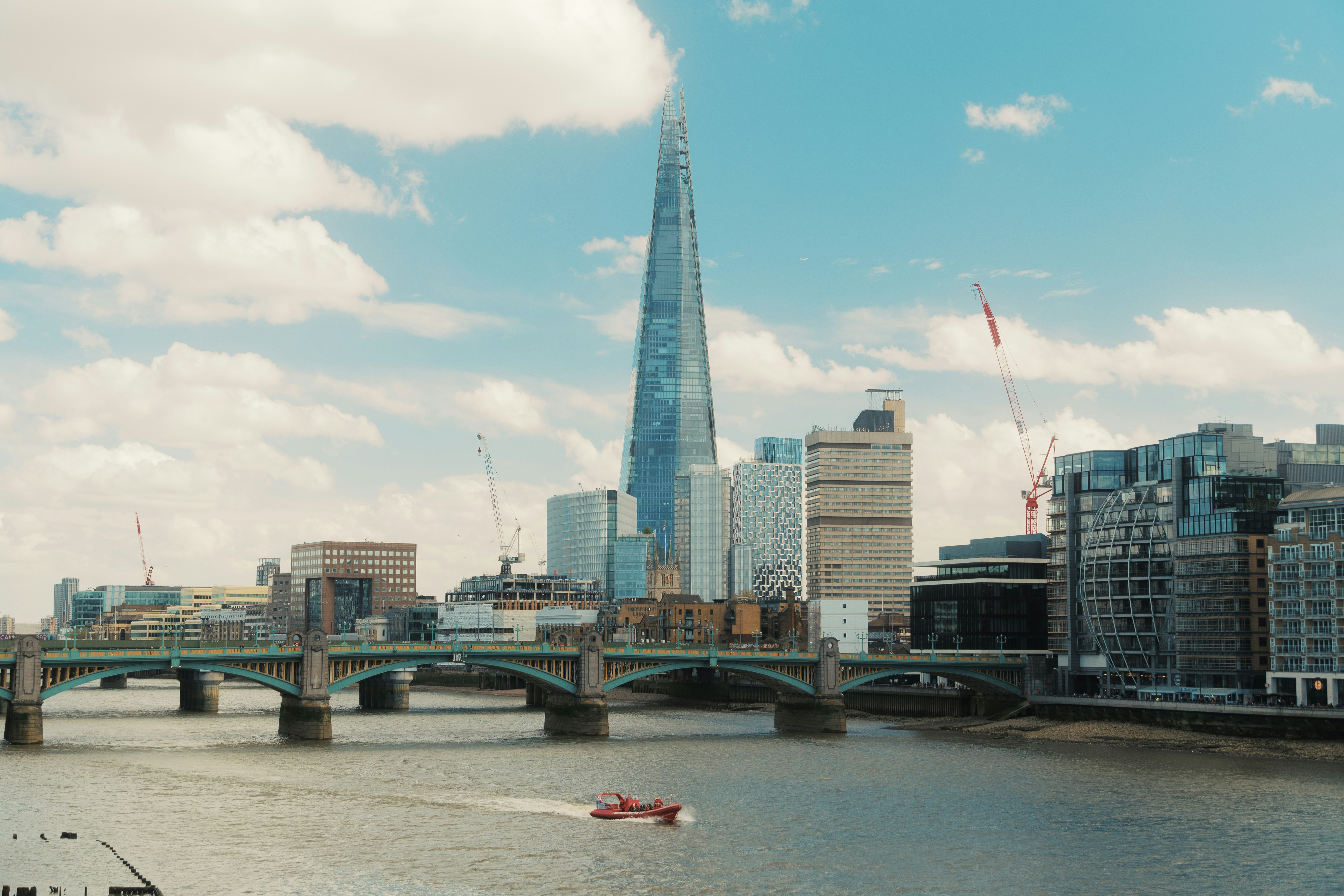 City Pulse: The Shimmering Spire Over the Thames-inspired Skyline