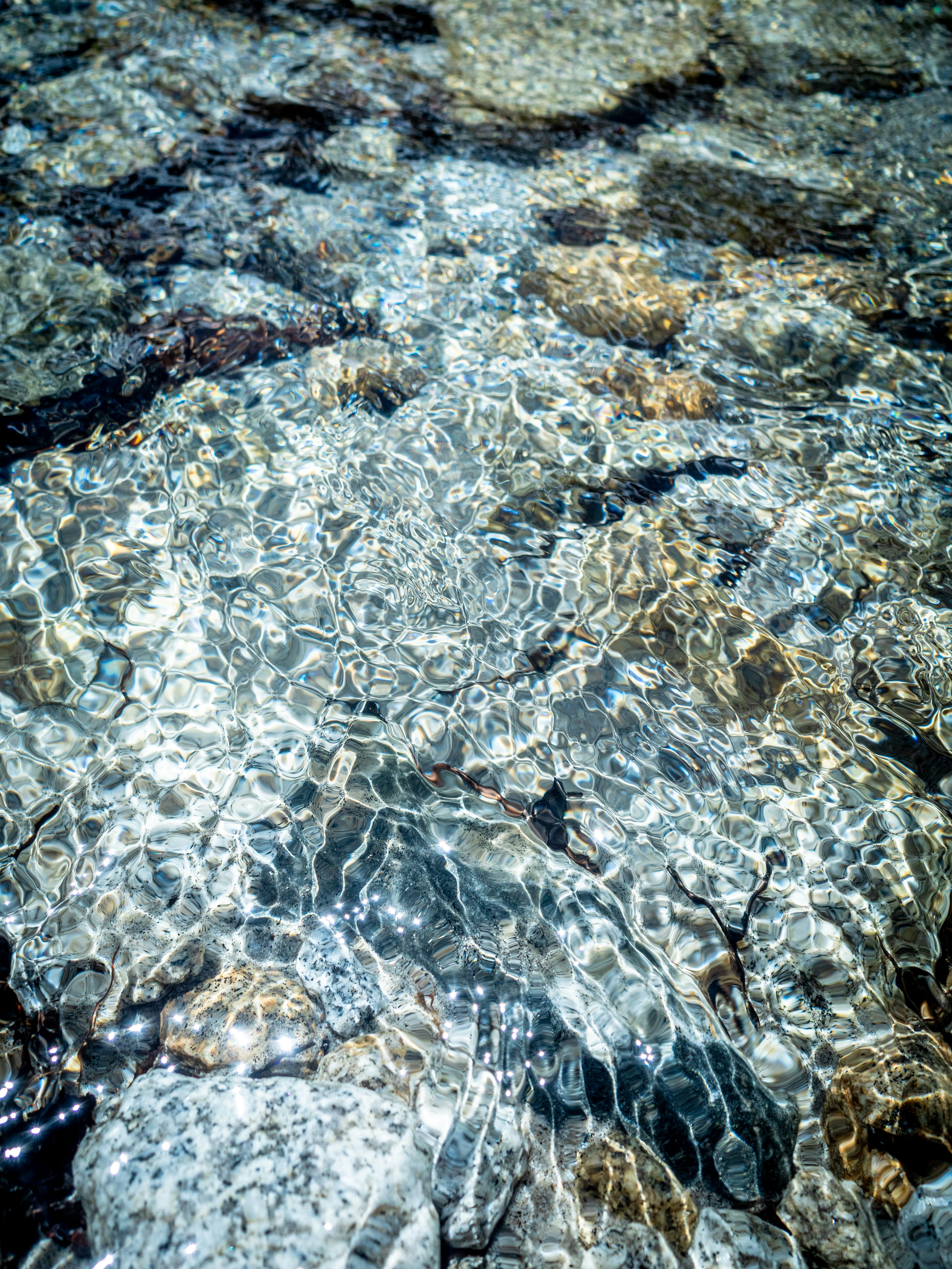 Waves of Light on Pebble Mosaic
