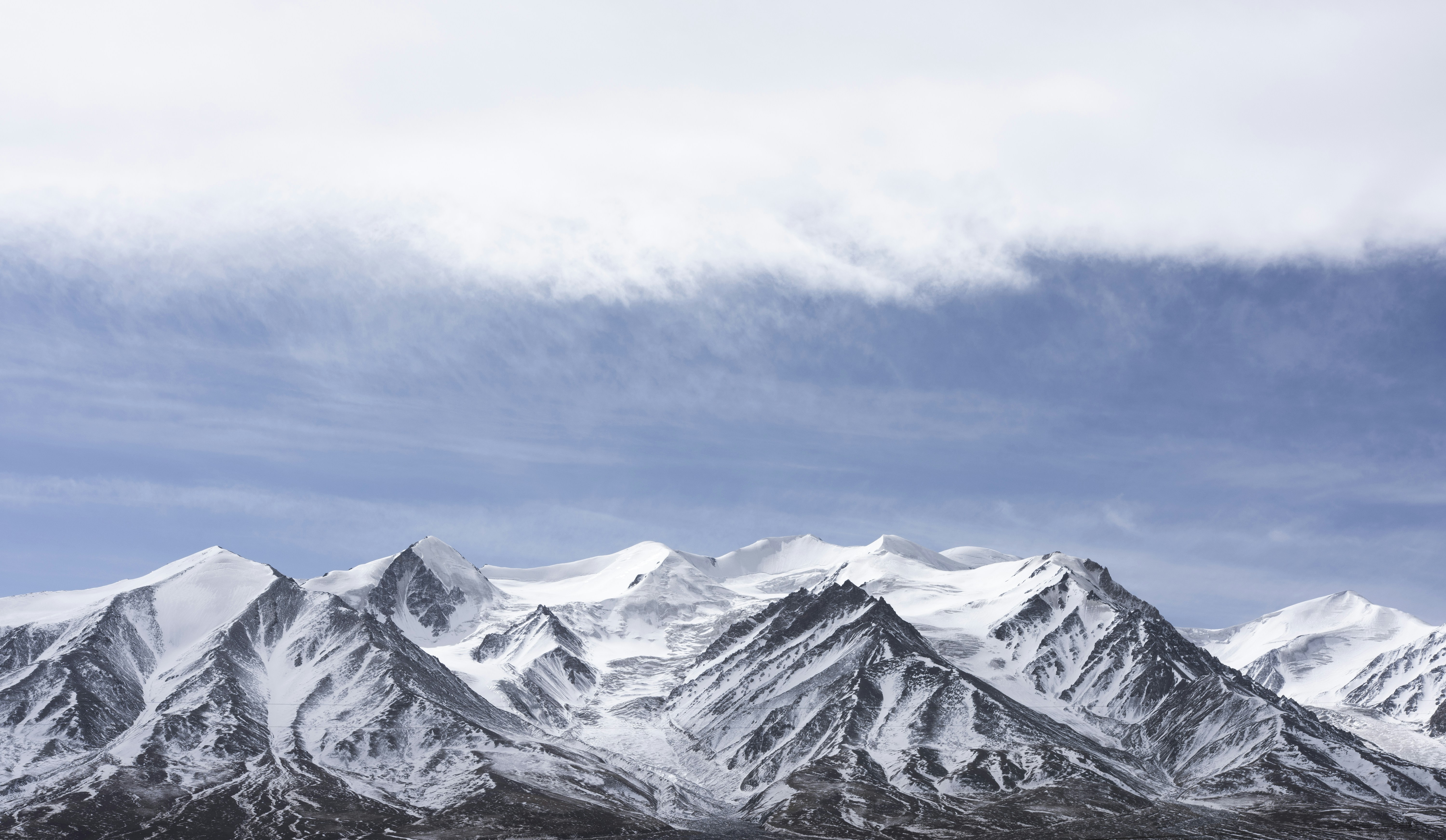 Snowbound Ridge Under a Clear Blue Vastness