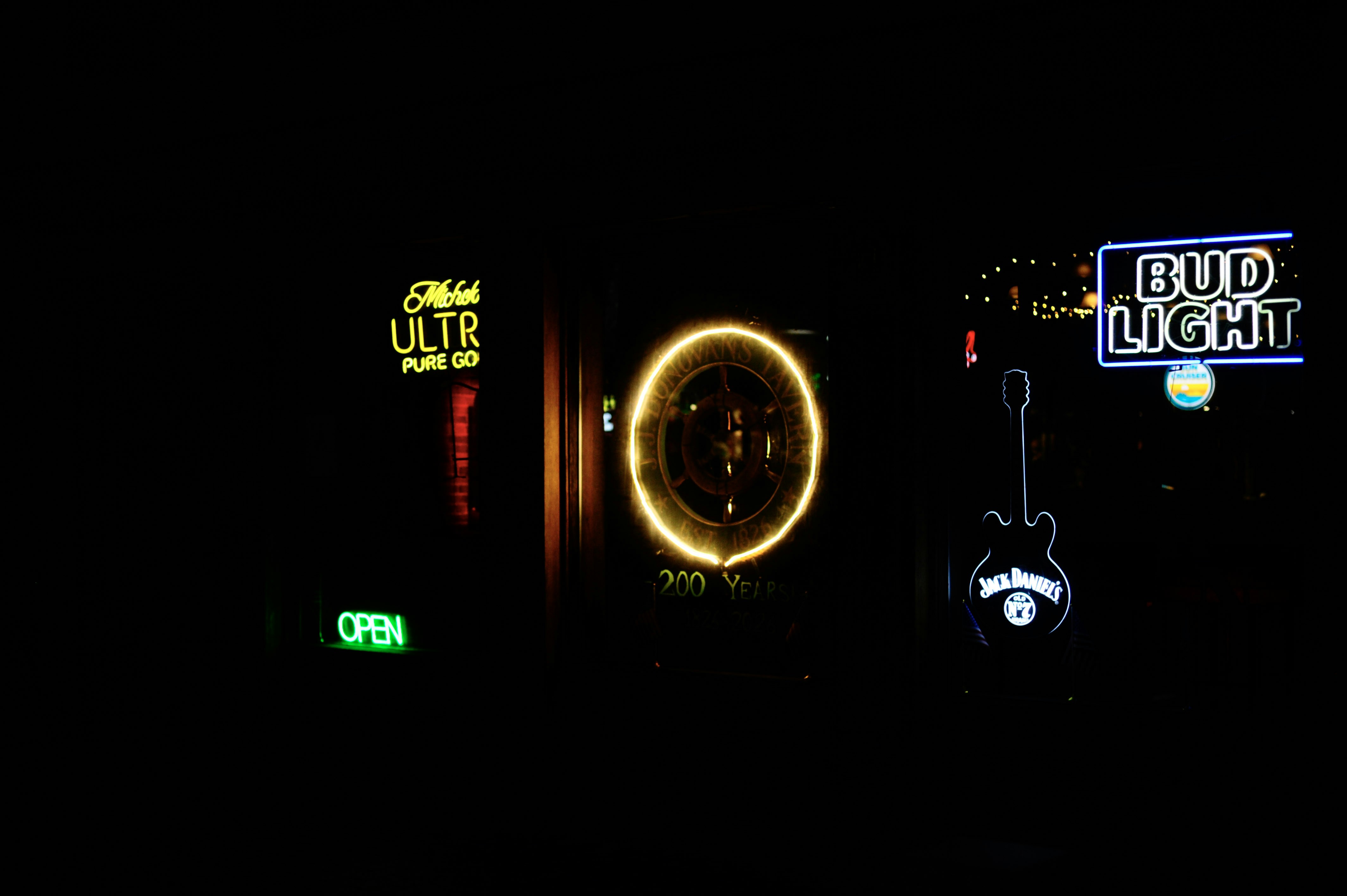 Neon Circle: A Quiet Row of Night Signatures
