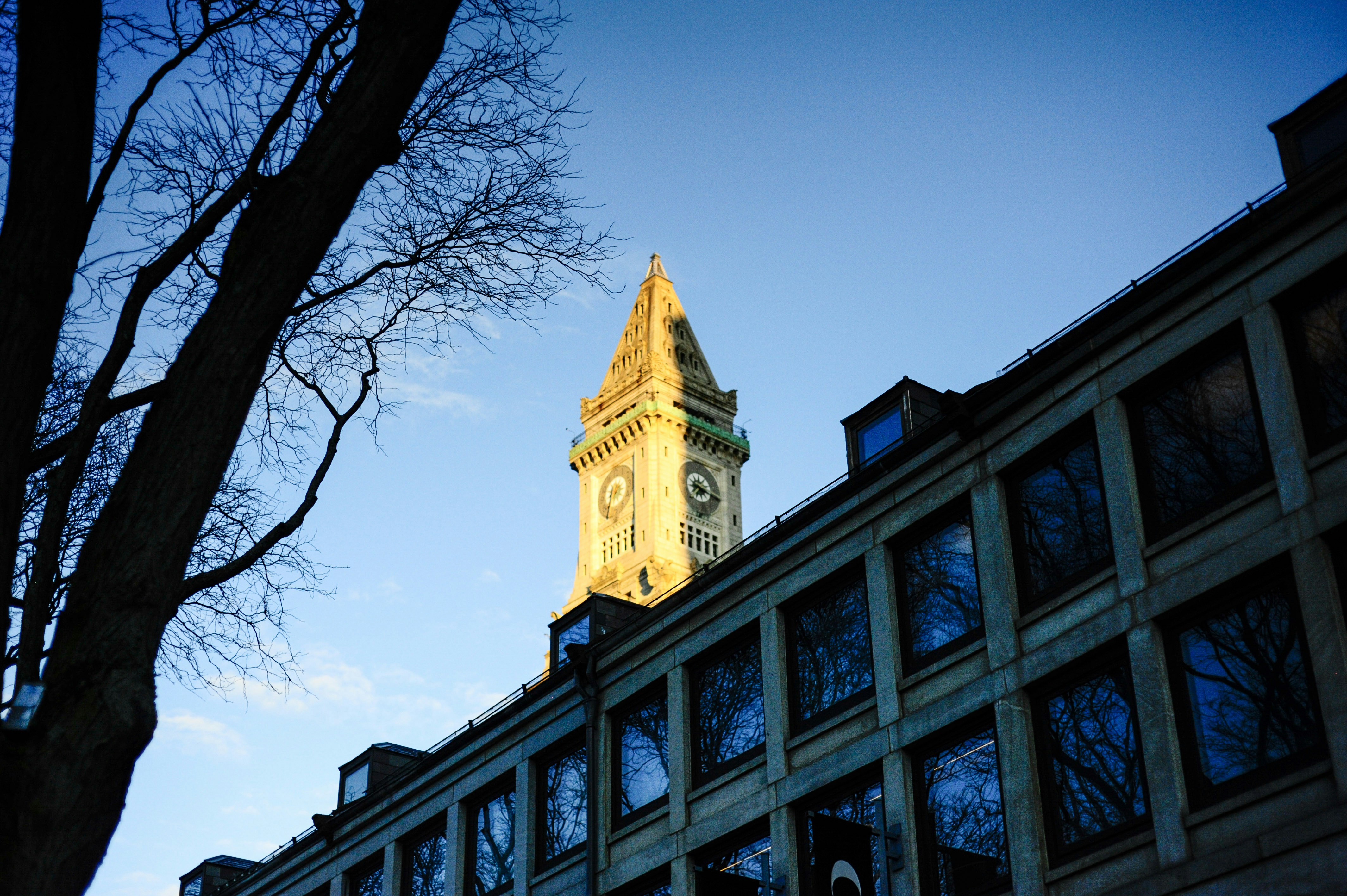 Clocktower in the City Backlit by a Clear Sky