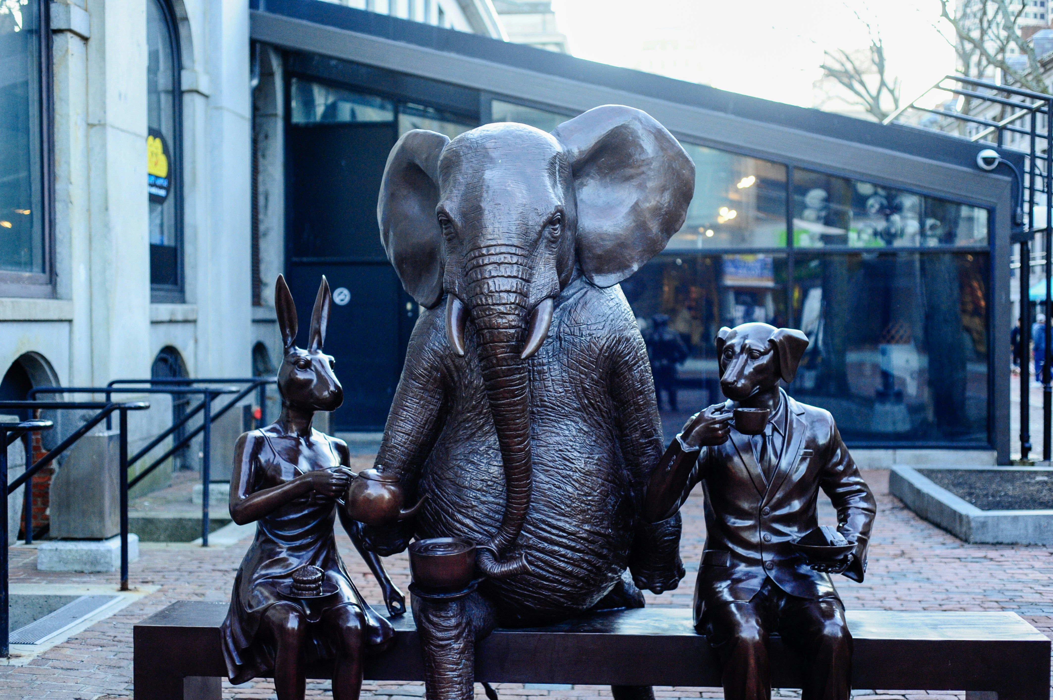 Three-Wold Companions: A Bronze Elephant Flanked by Anthropomorphic Figures
