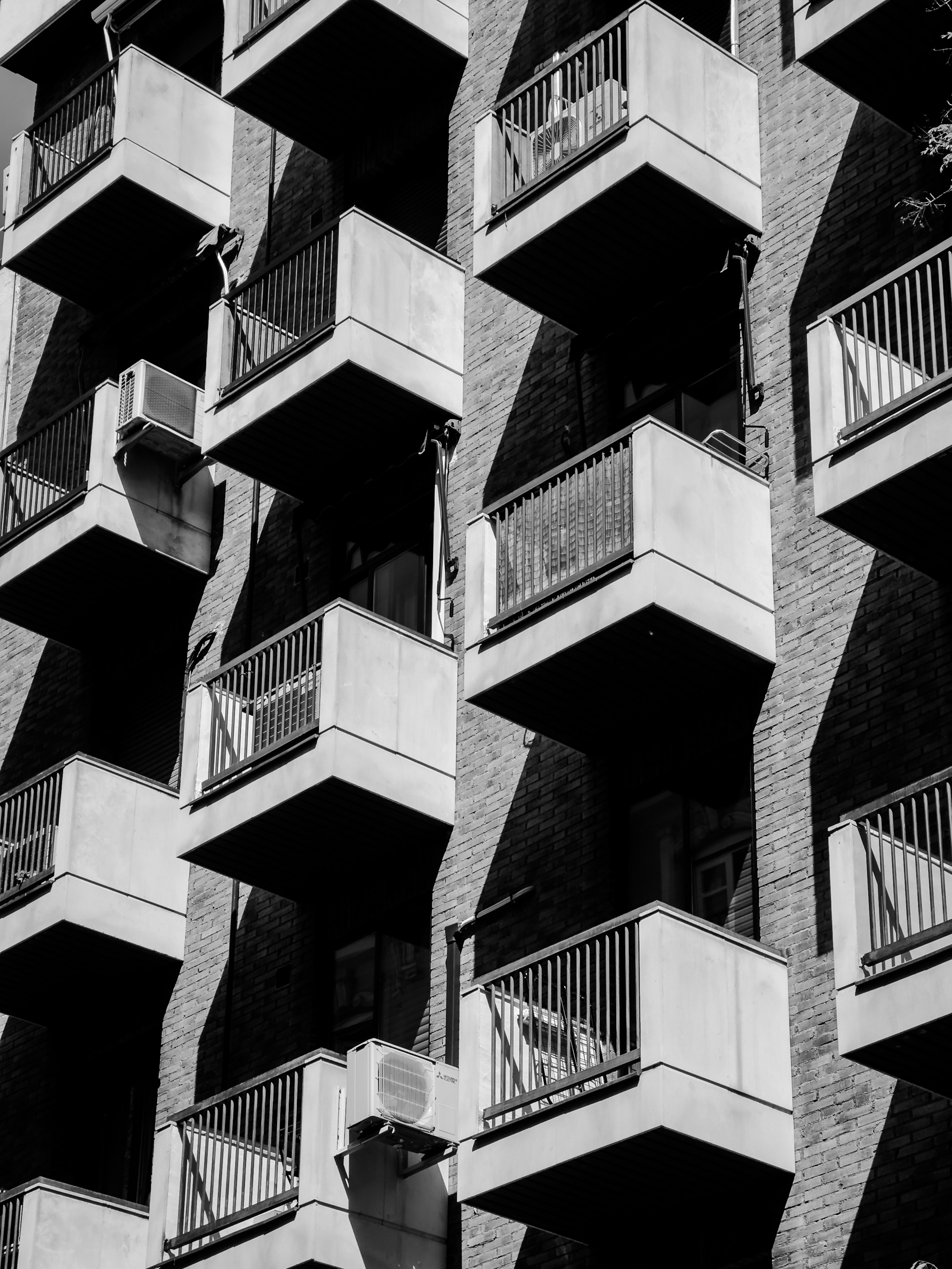 Industrial Geometry: A Cascade of Balconies in Monochrome