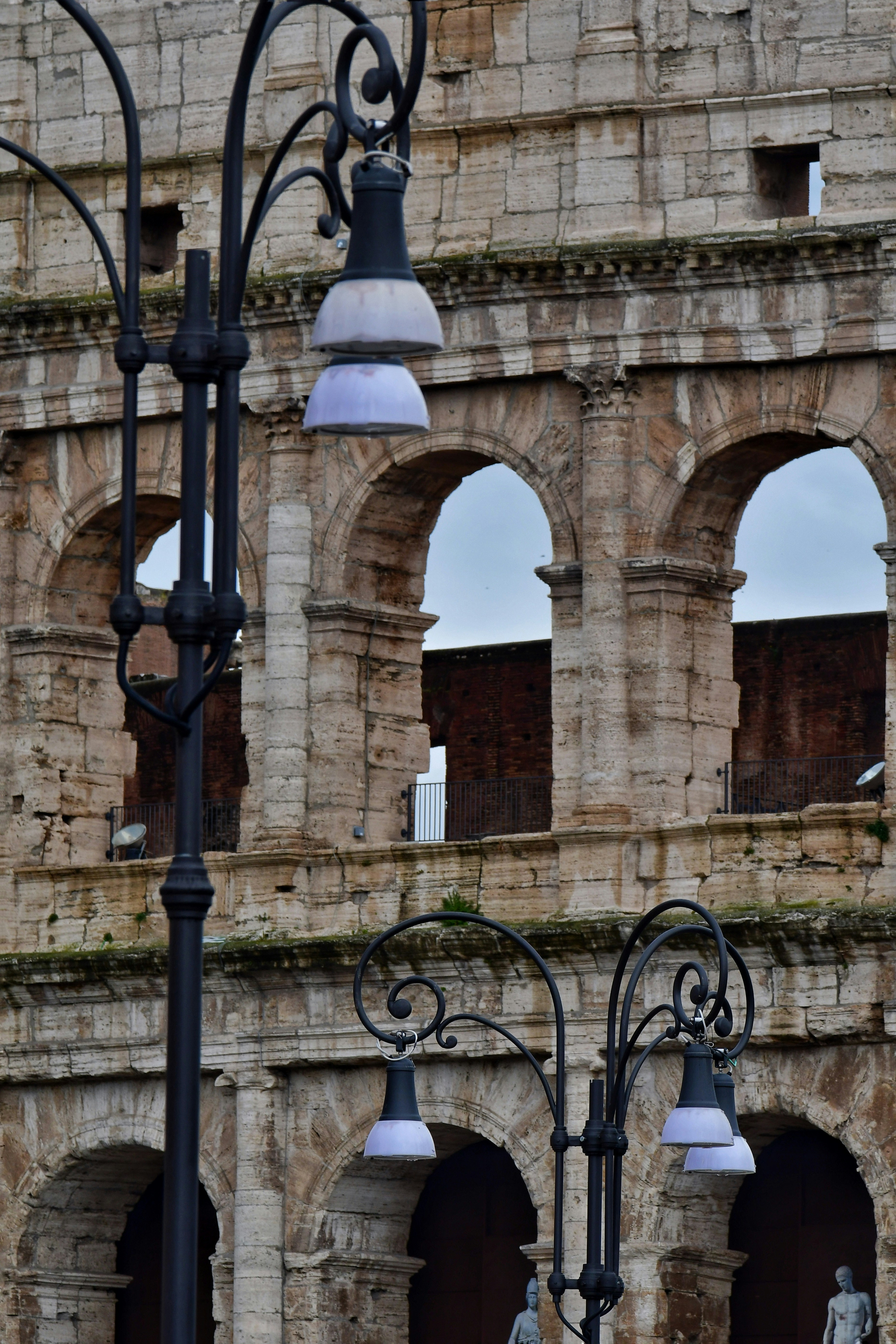 Iron Lamps Over the Ancient Arches