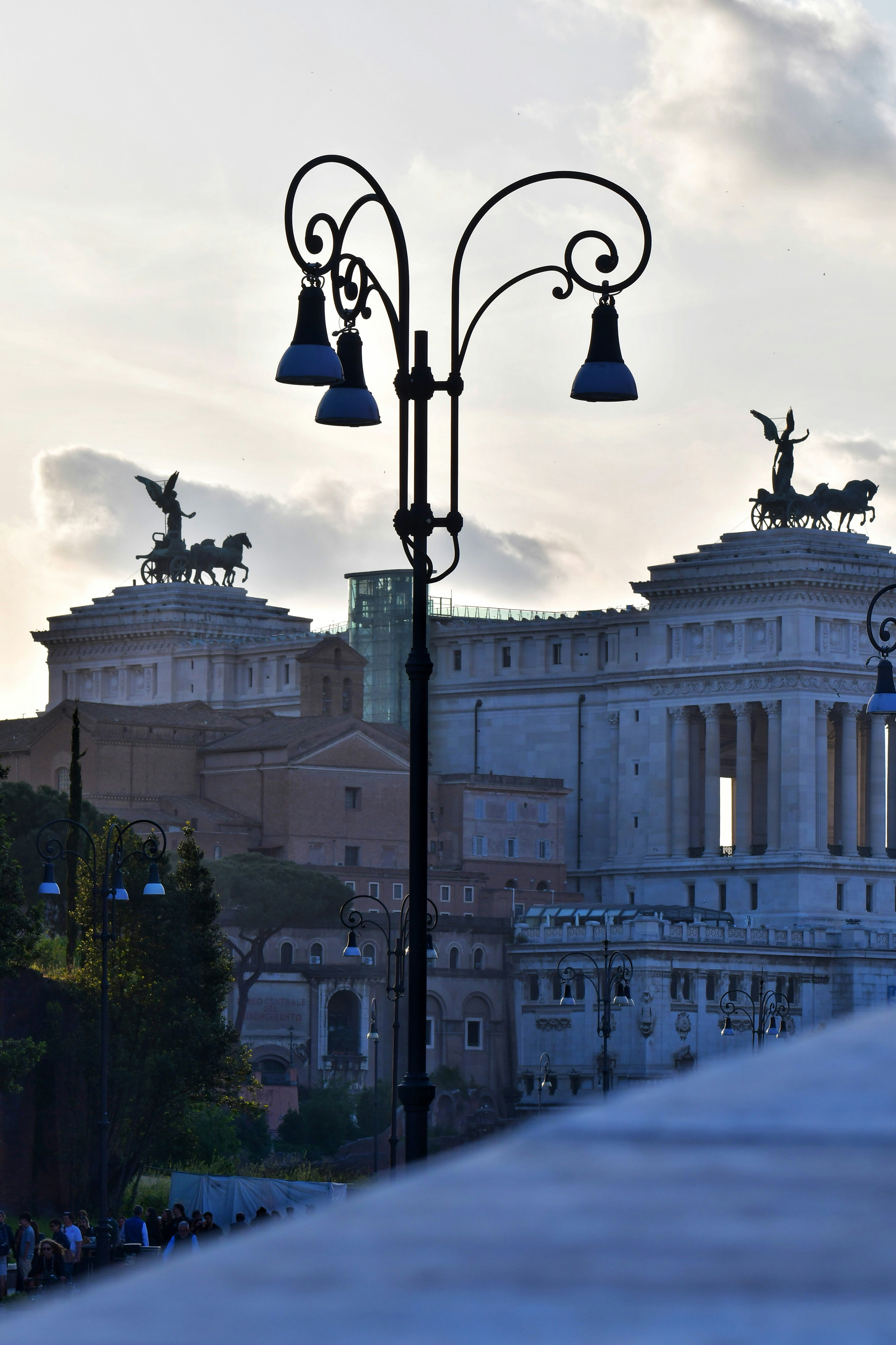 Silhouetted Lanterns Over the Arch: Evening at the City Gate