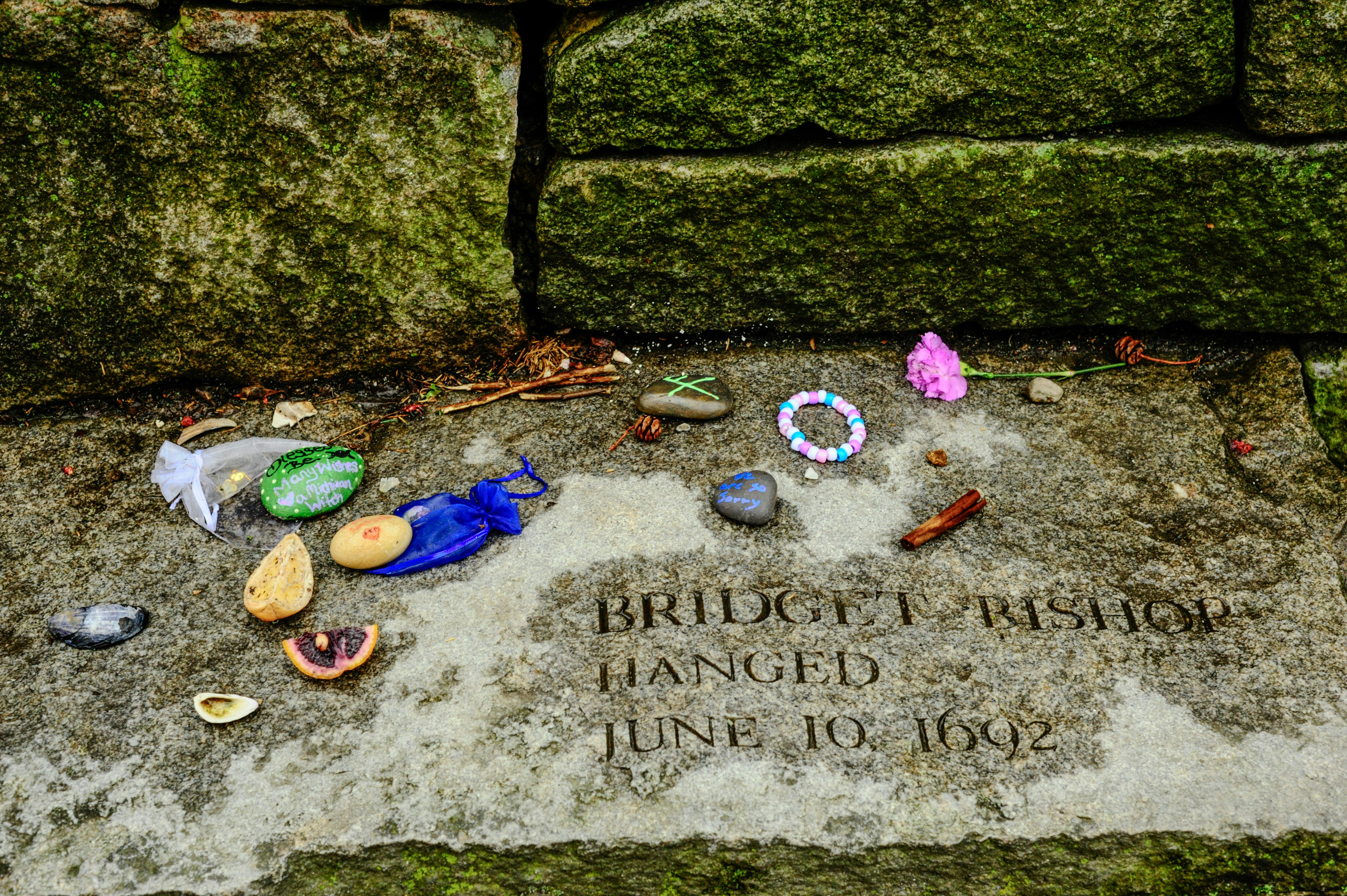 Stone Memorial Surrounded by Trinkets: A Quiet Tribute to Bridport Mission