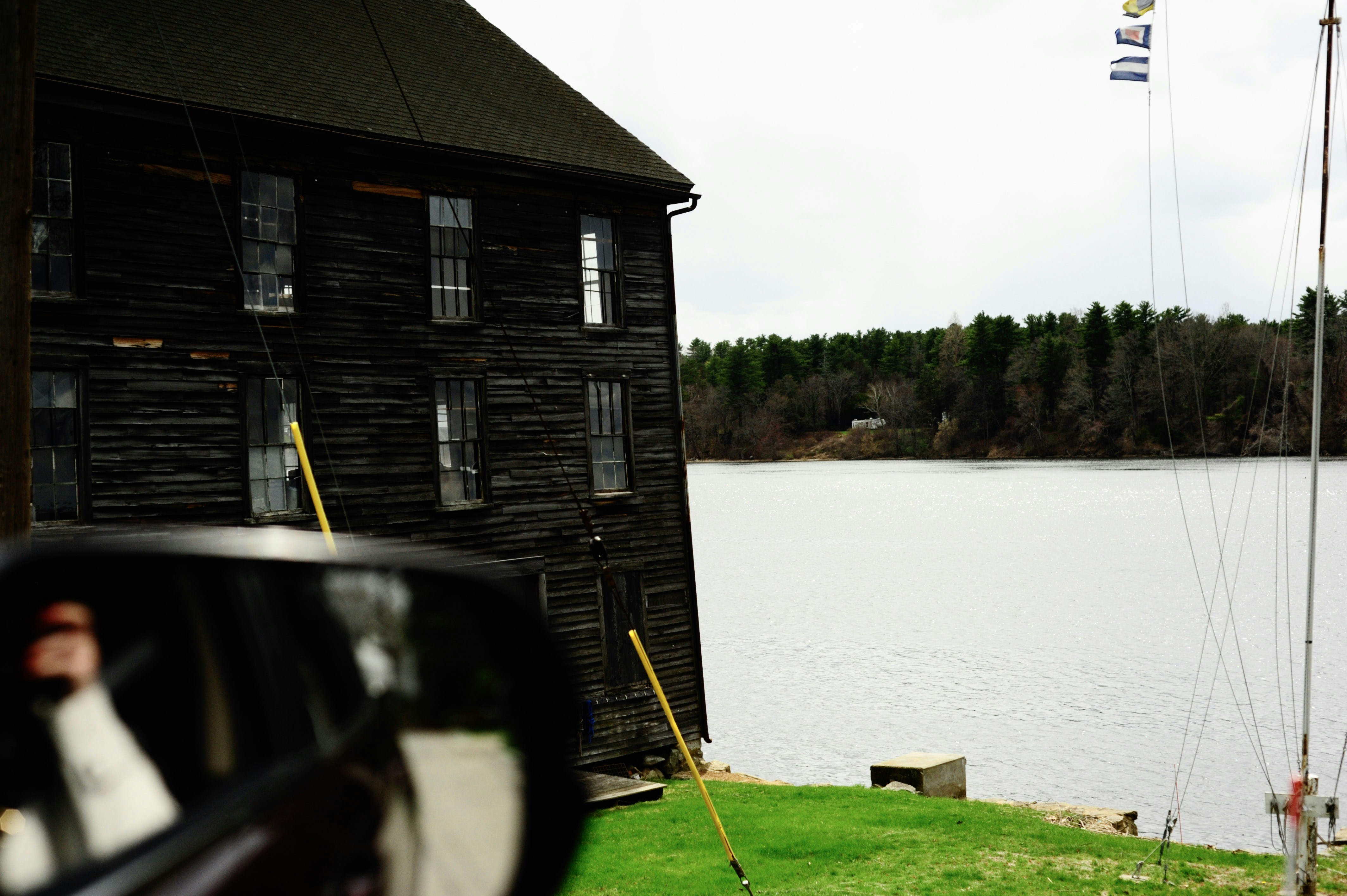 Weathered boathouse by the tranquil lake