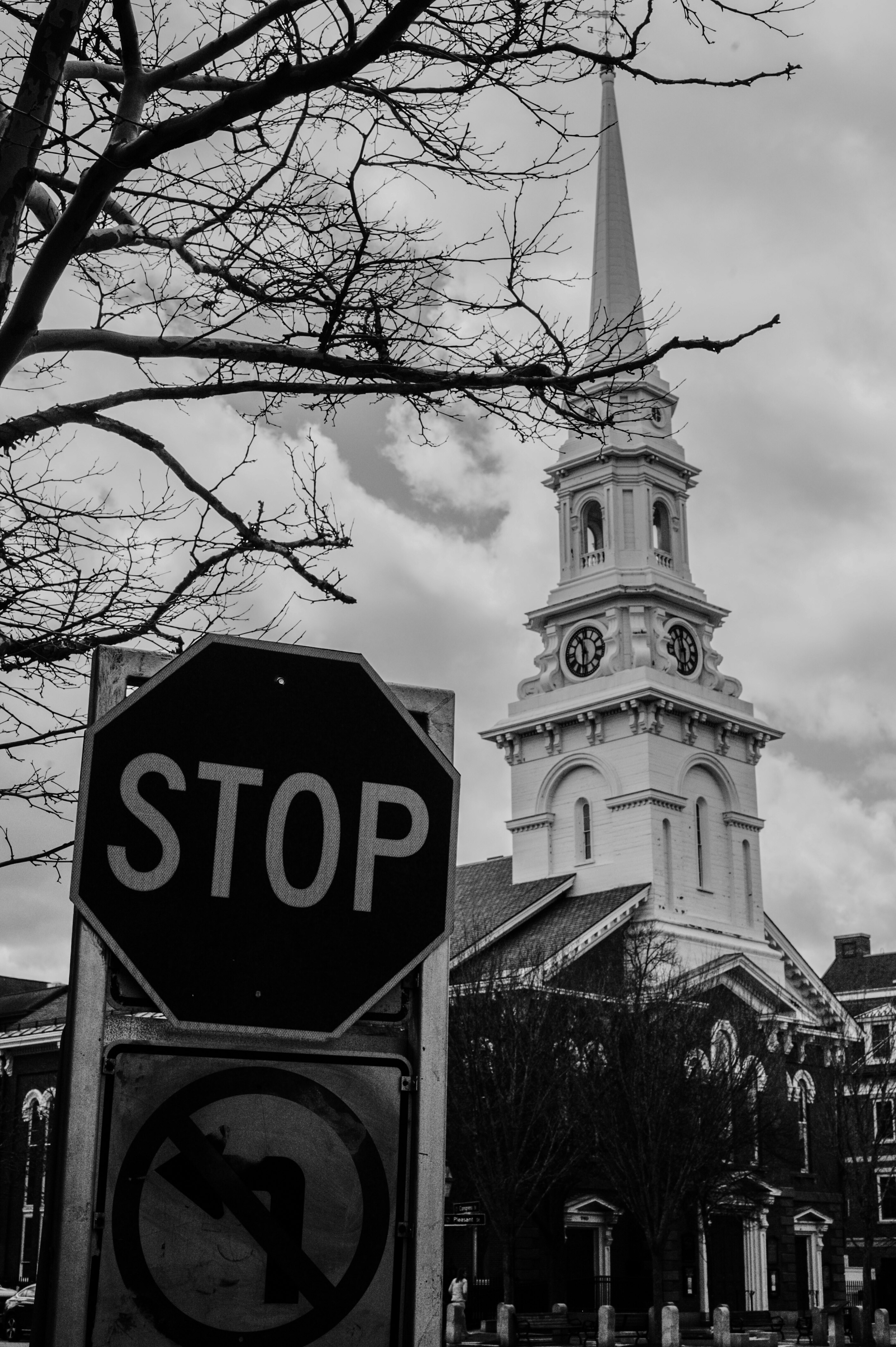 Stop Sign Framing a Church Steeple
