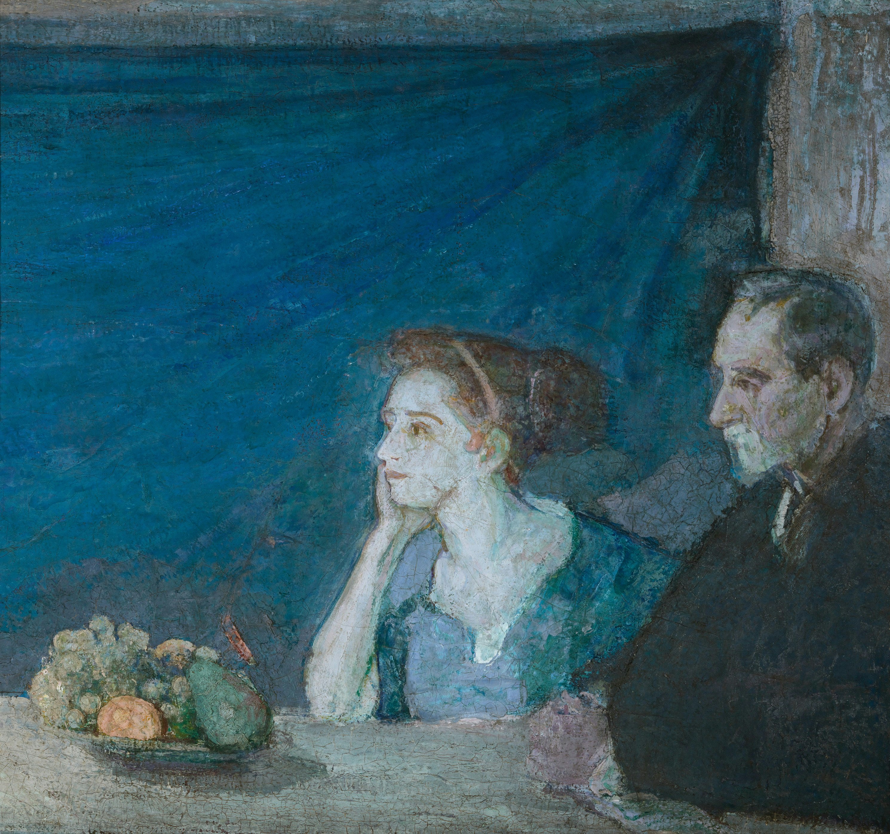 Quiet Supper: A Moment of Thought Beneath a Blue Shade