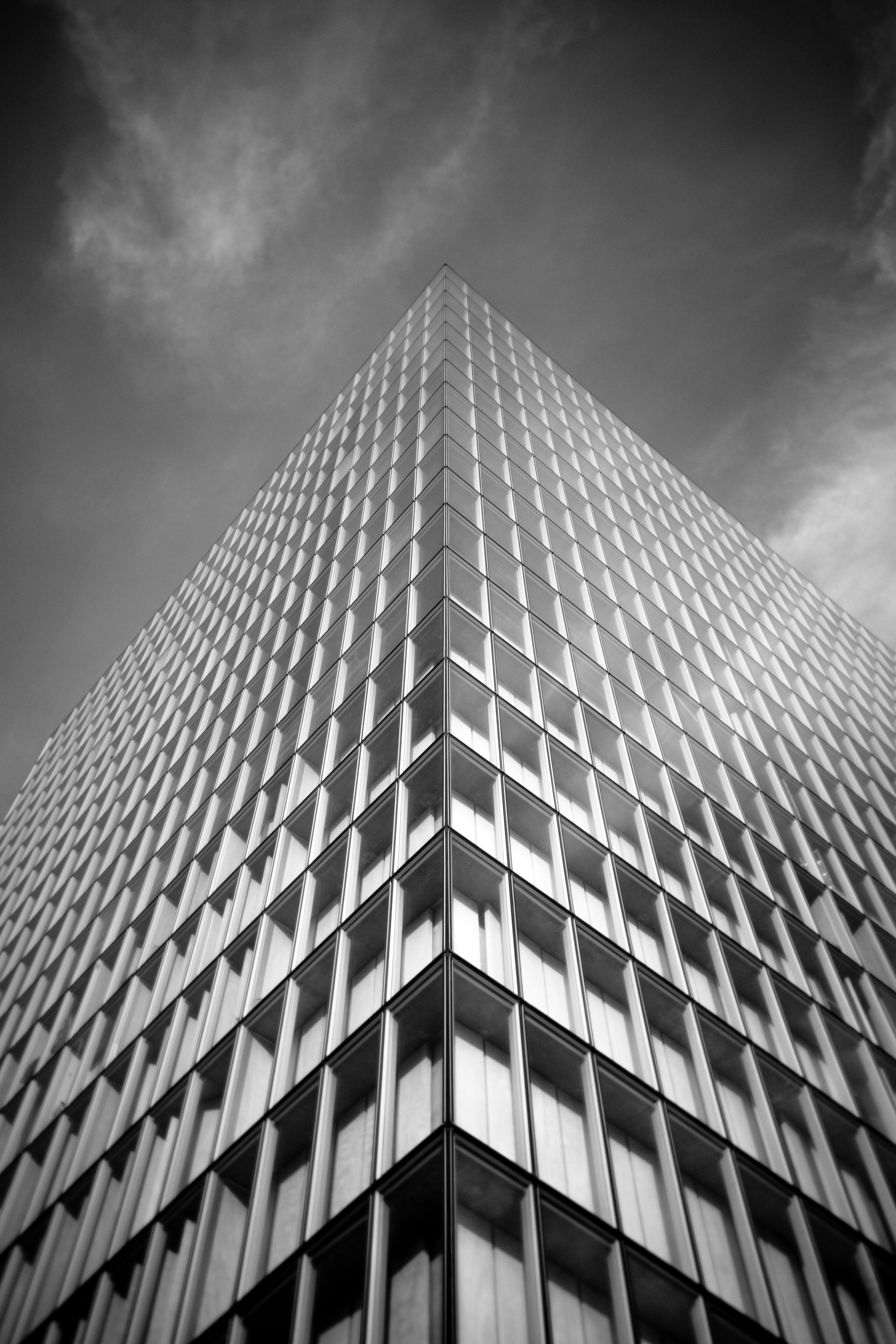 Tilted Glass Monolith Reaching for the Sky