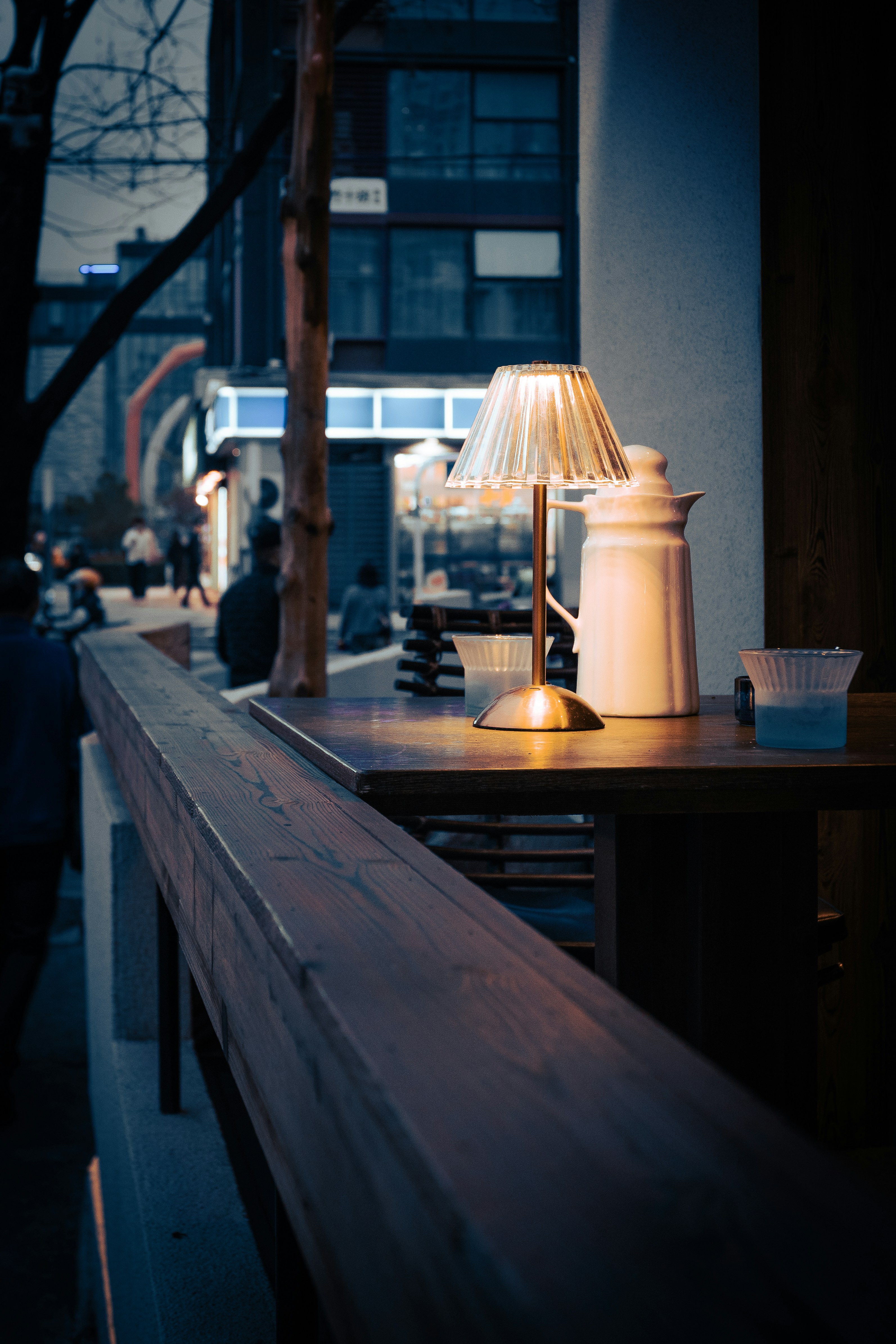 Ambient Night Café: A Warm Lamp Holds Court on the Wooden Bar