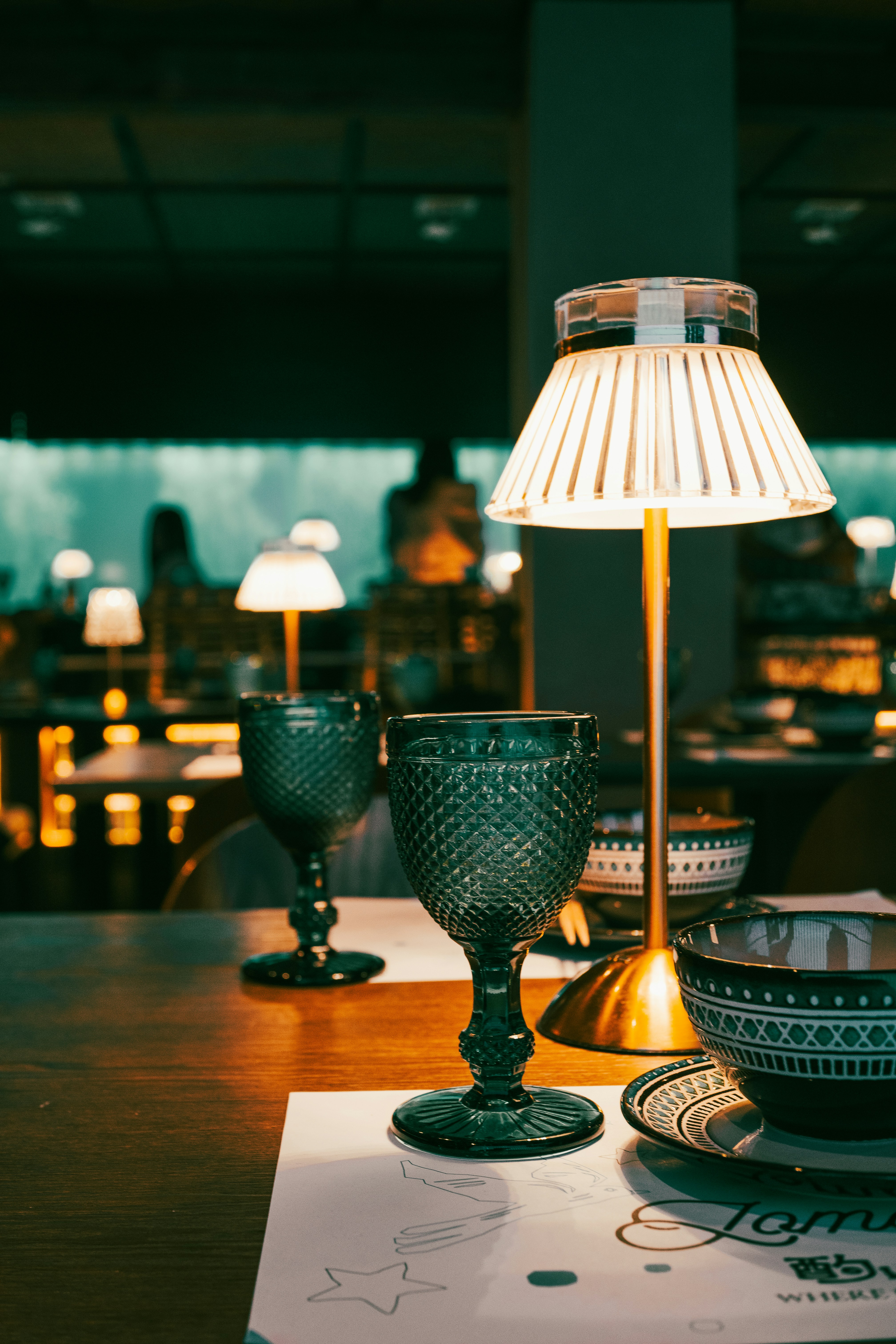 Amber Glasses and a Soft Glow: A Quiet Table in Ambient Dining