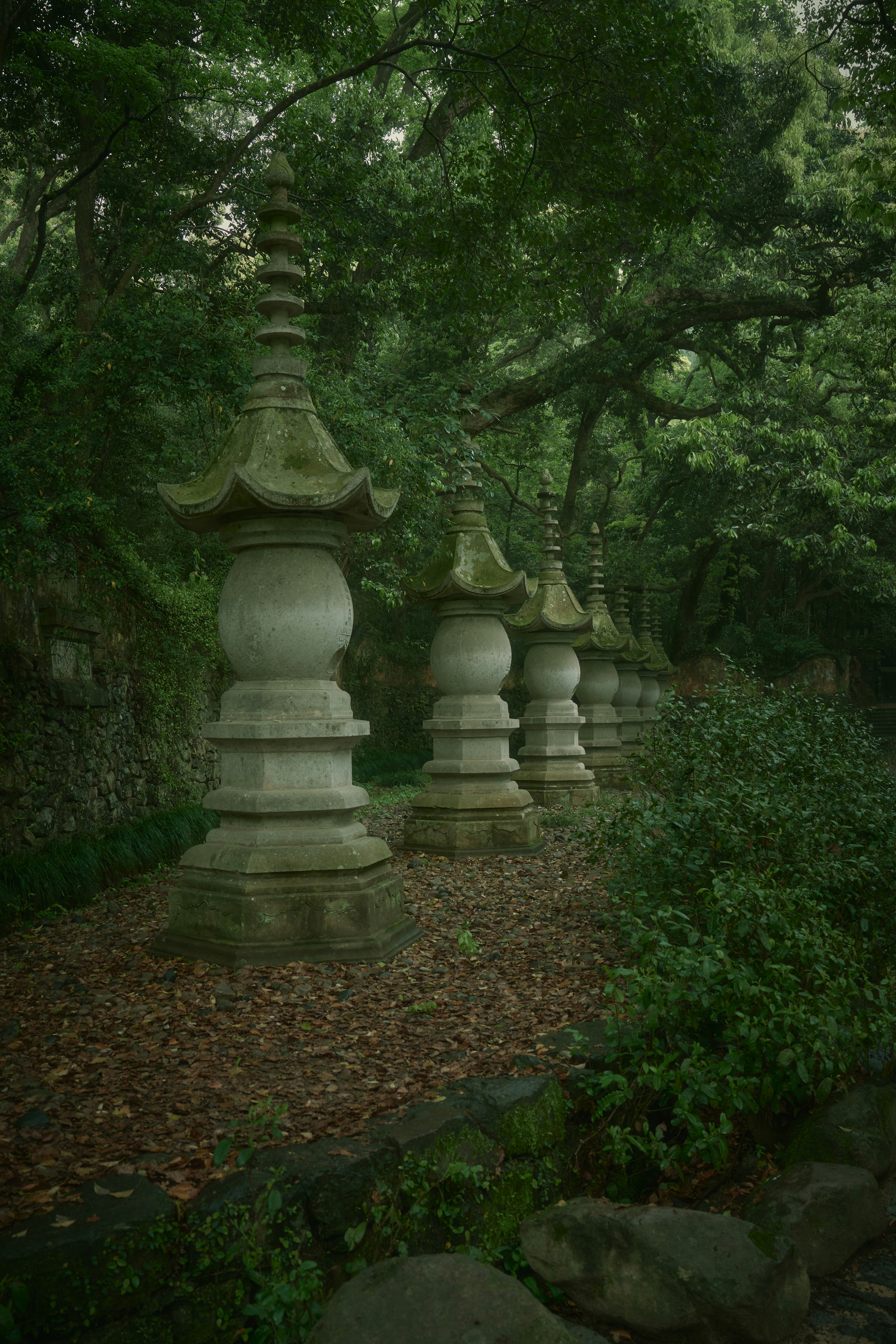 Stone Lanterns in a Quiet Garden Corridor