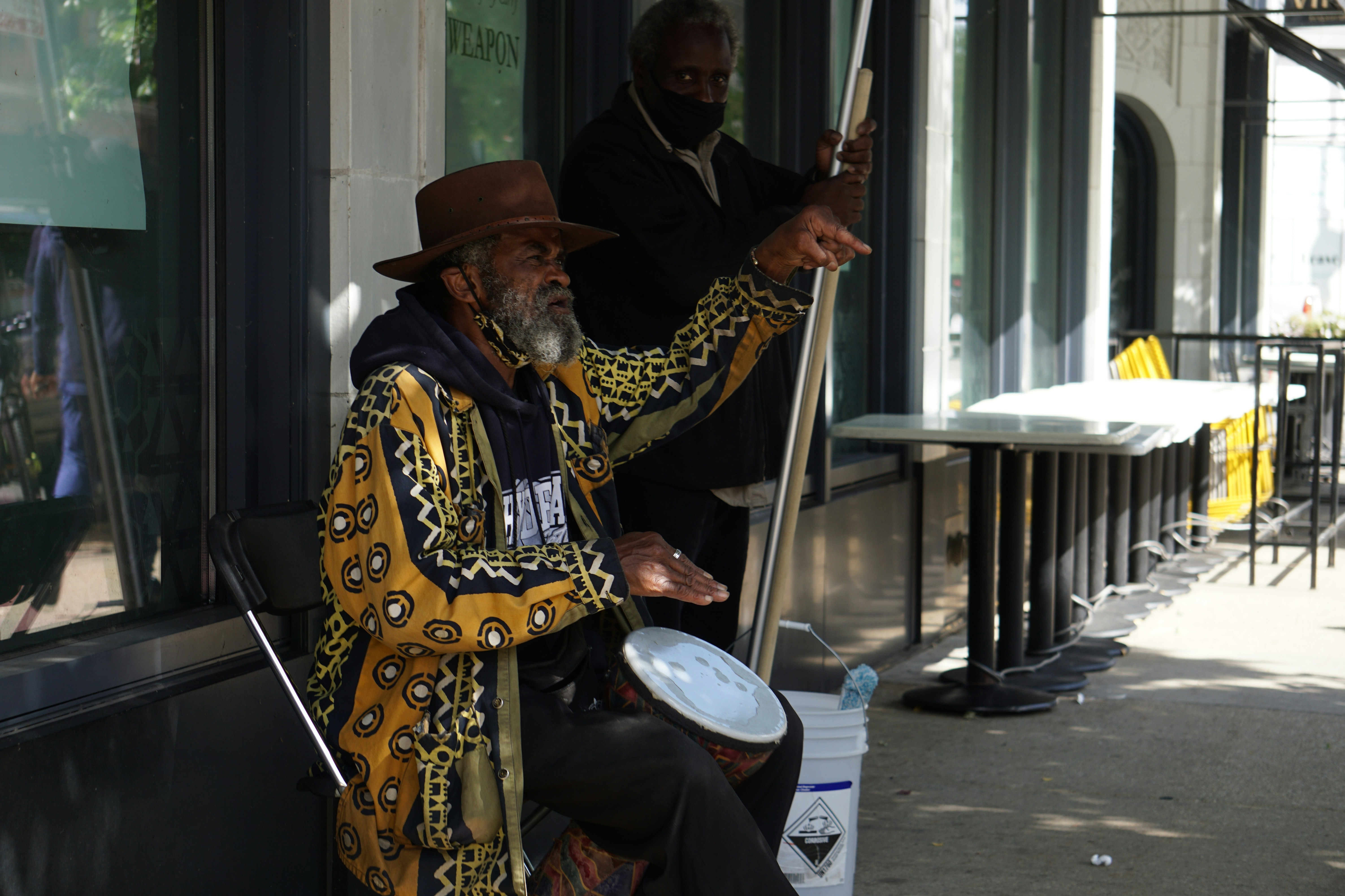 Street Serenade: The Drummer's Waiting Rhythm