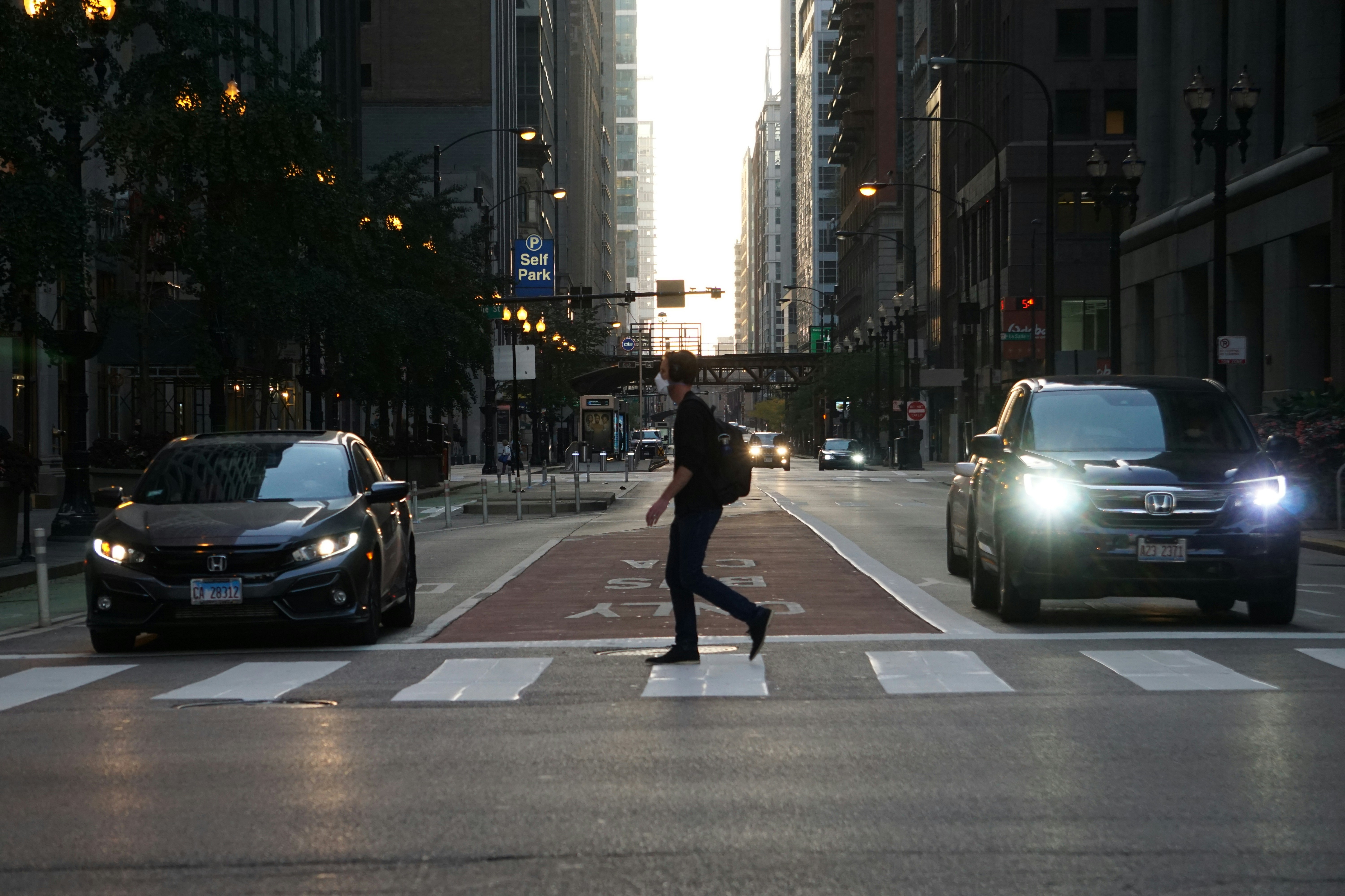 Crosswalk Pulse: A Pedestrian Steps Between City Traffic