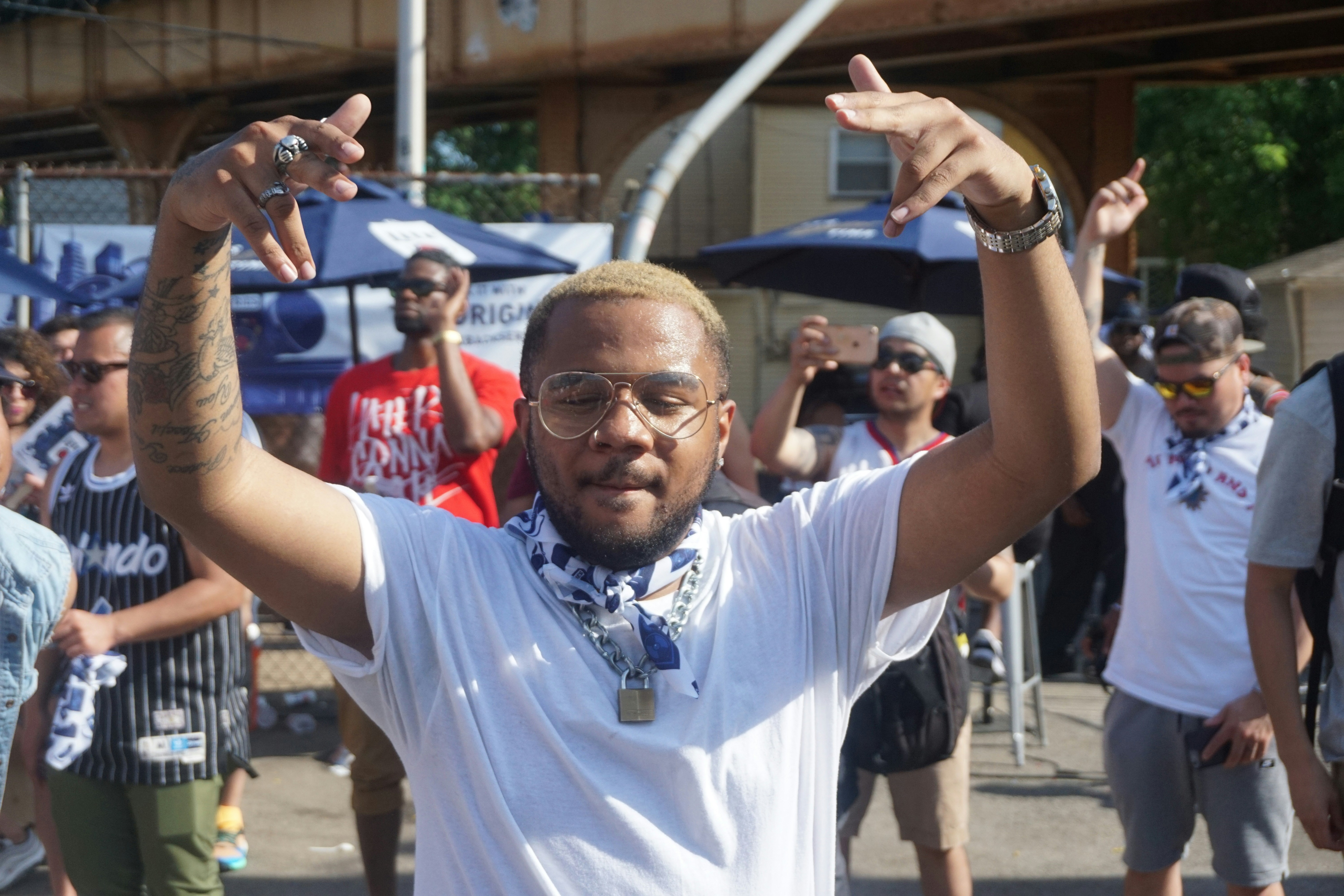 Mid-Hands Raised: Street Performance Engagement