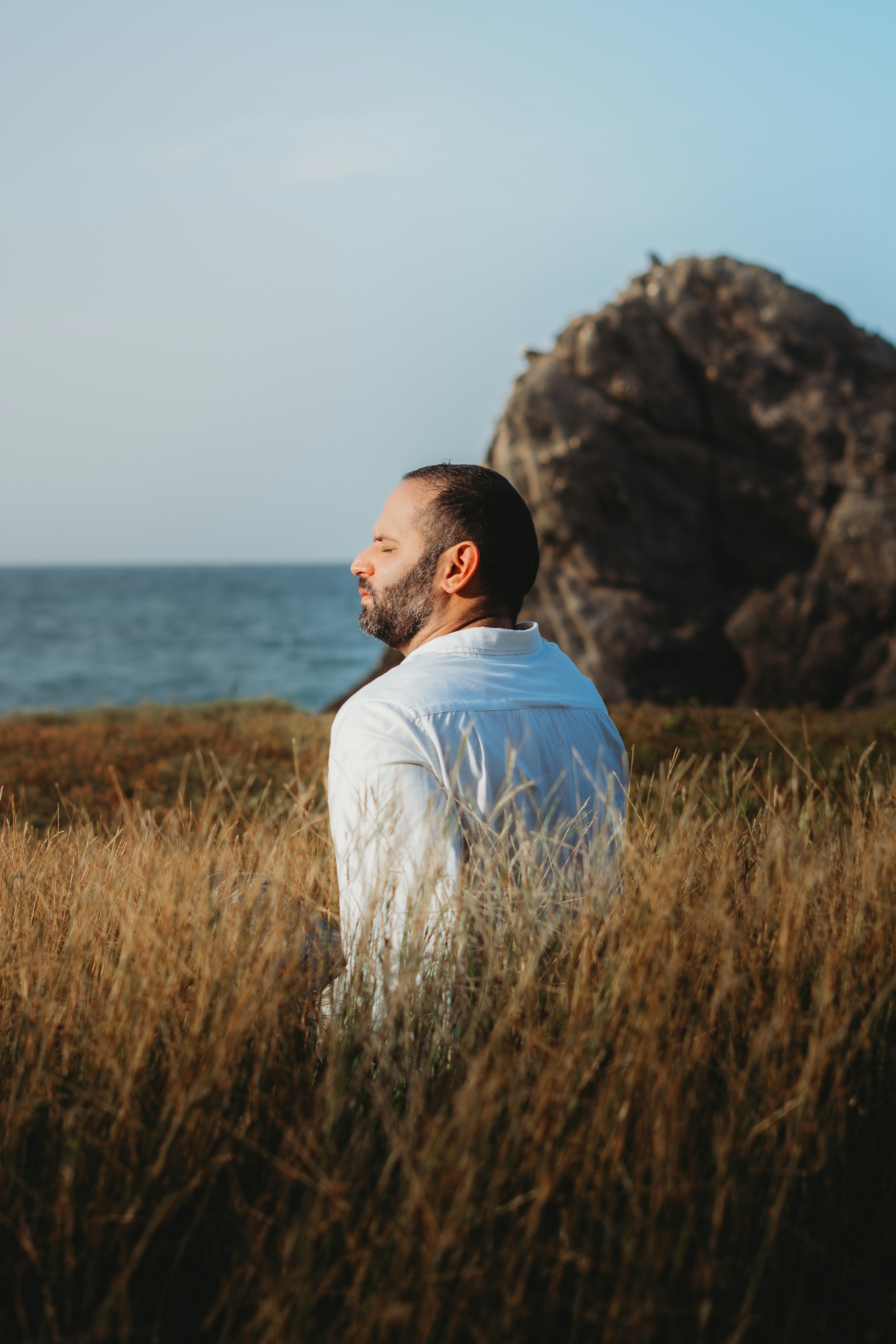 Coastal Quiet: A Solitary Portrait among Sea Grass