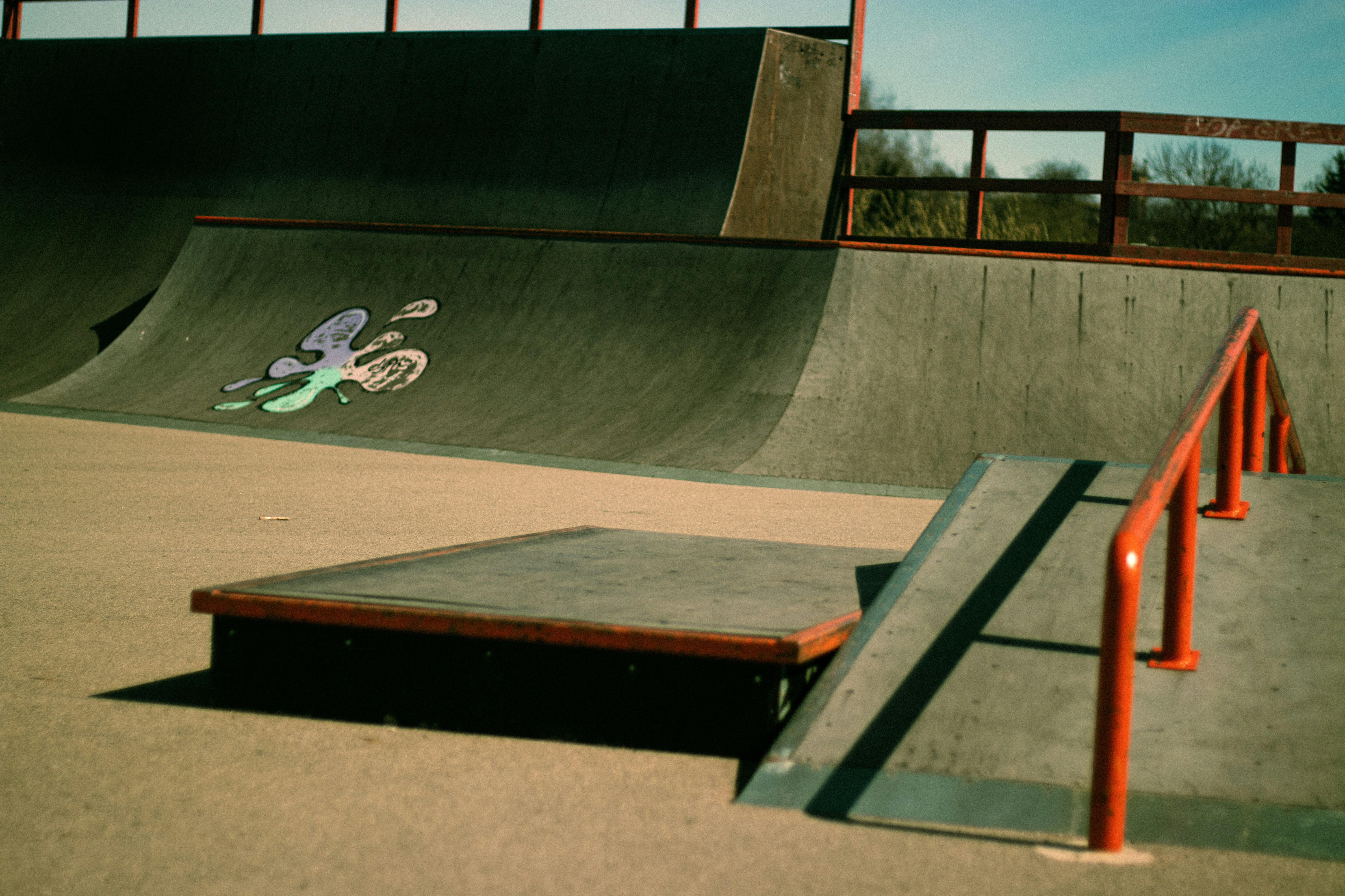 Sunlit Skate Park Ramp Framing a Quiet Moment
