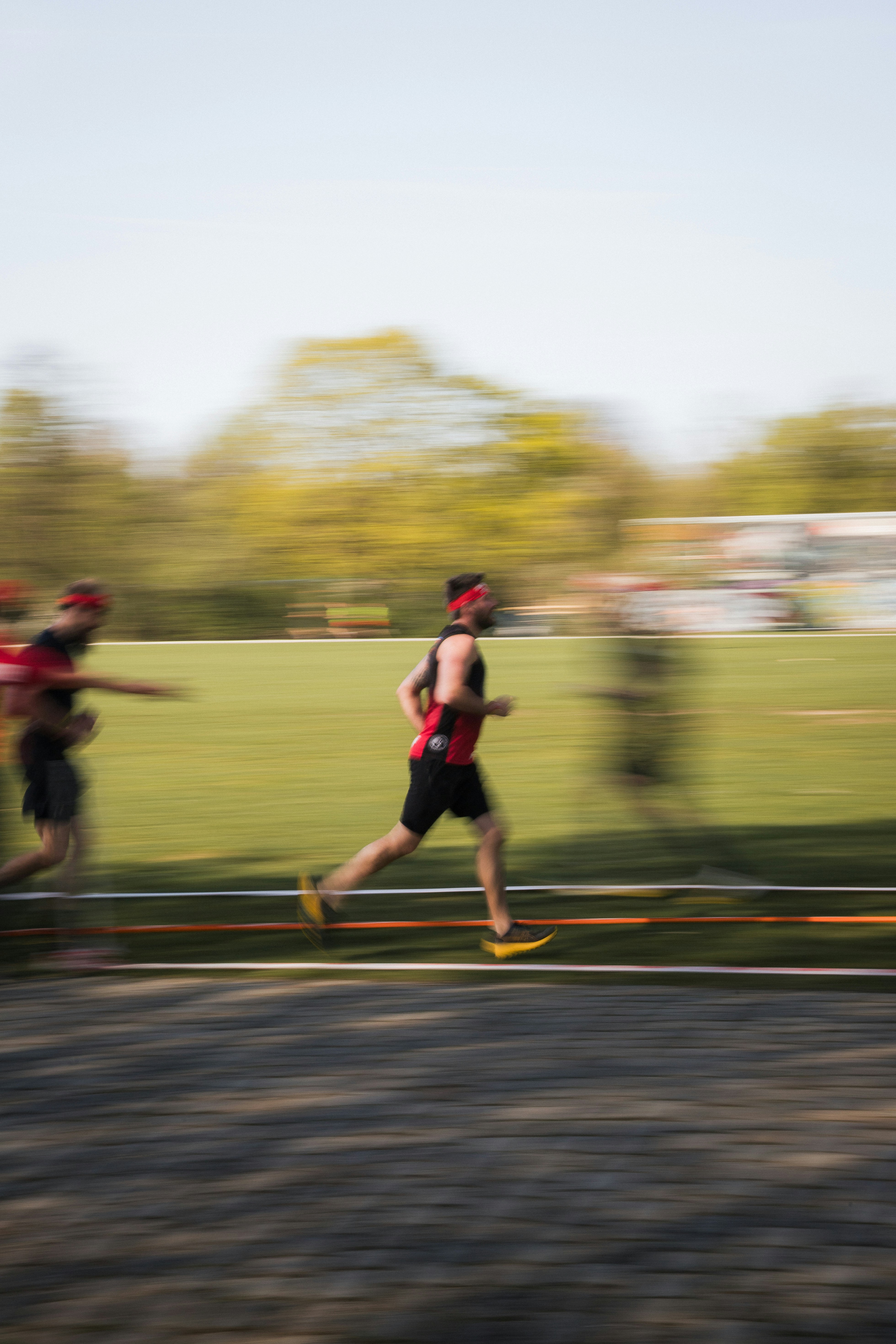Paced Pulse: A Runner Carves Through Motion in a Park