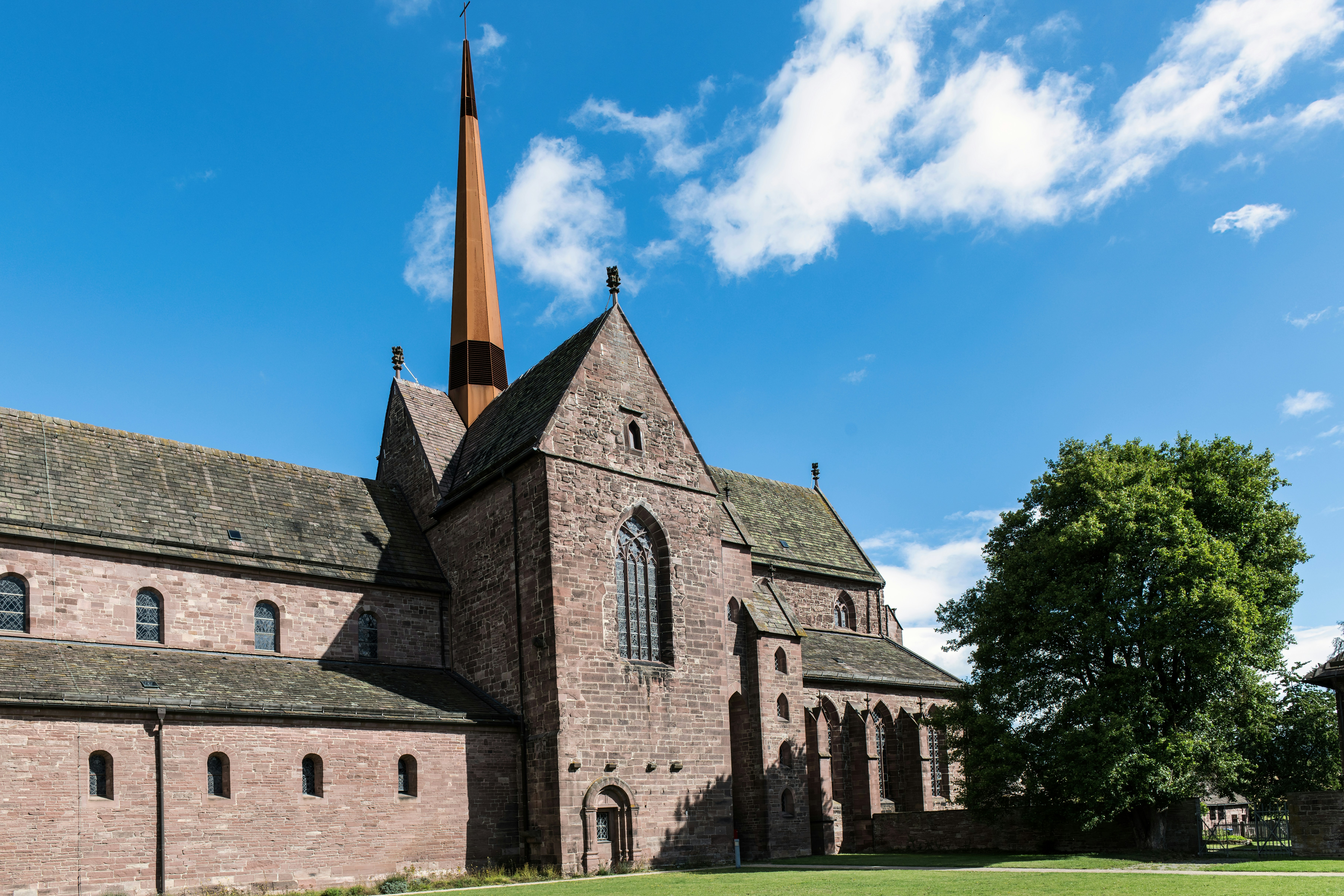Stone Abbey Under a Clear Summer Sky